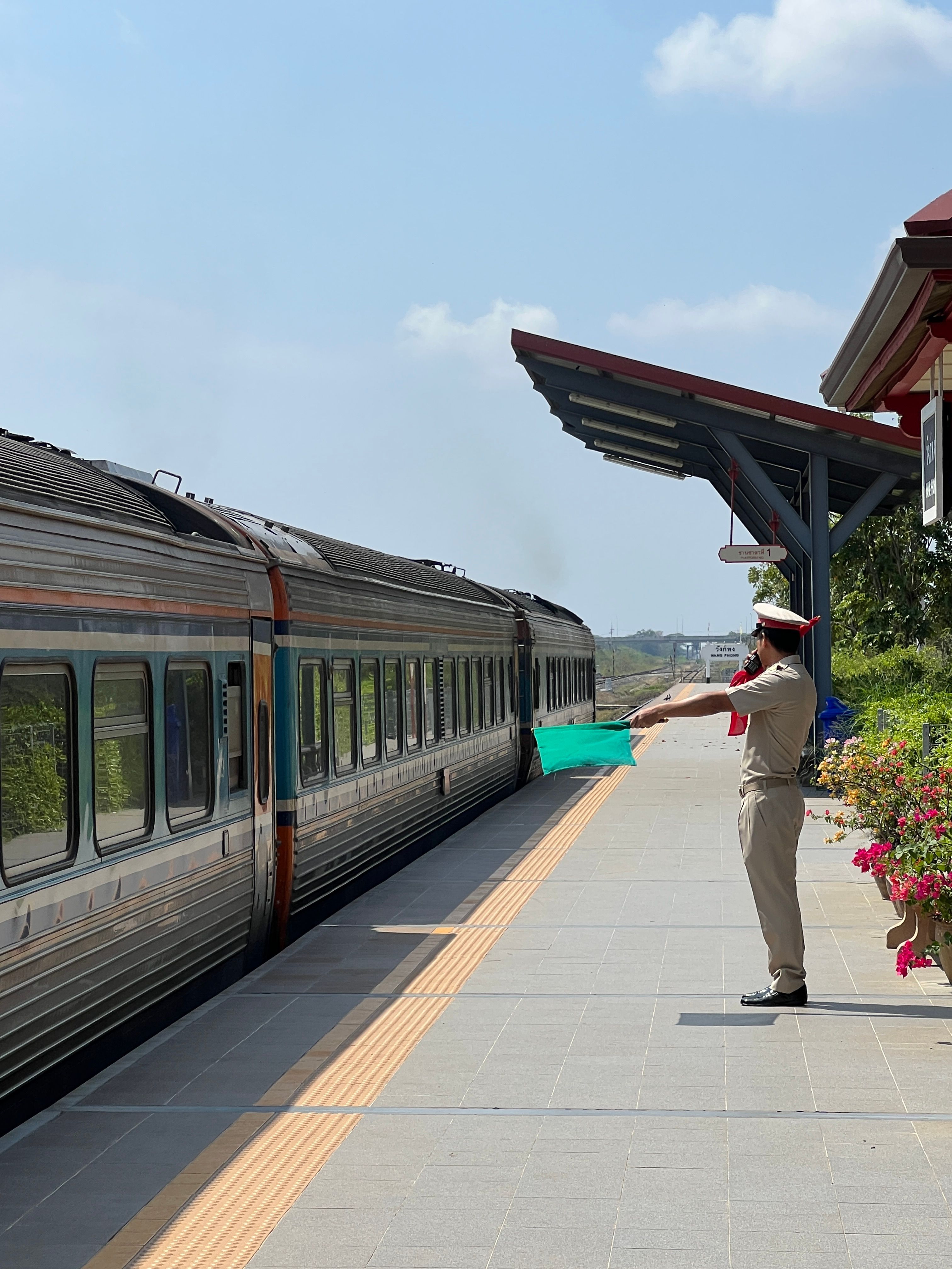 Train Conductor at Railway Platform in Daylight · Free Stock Photo