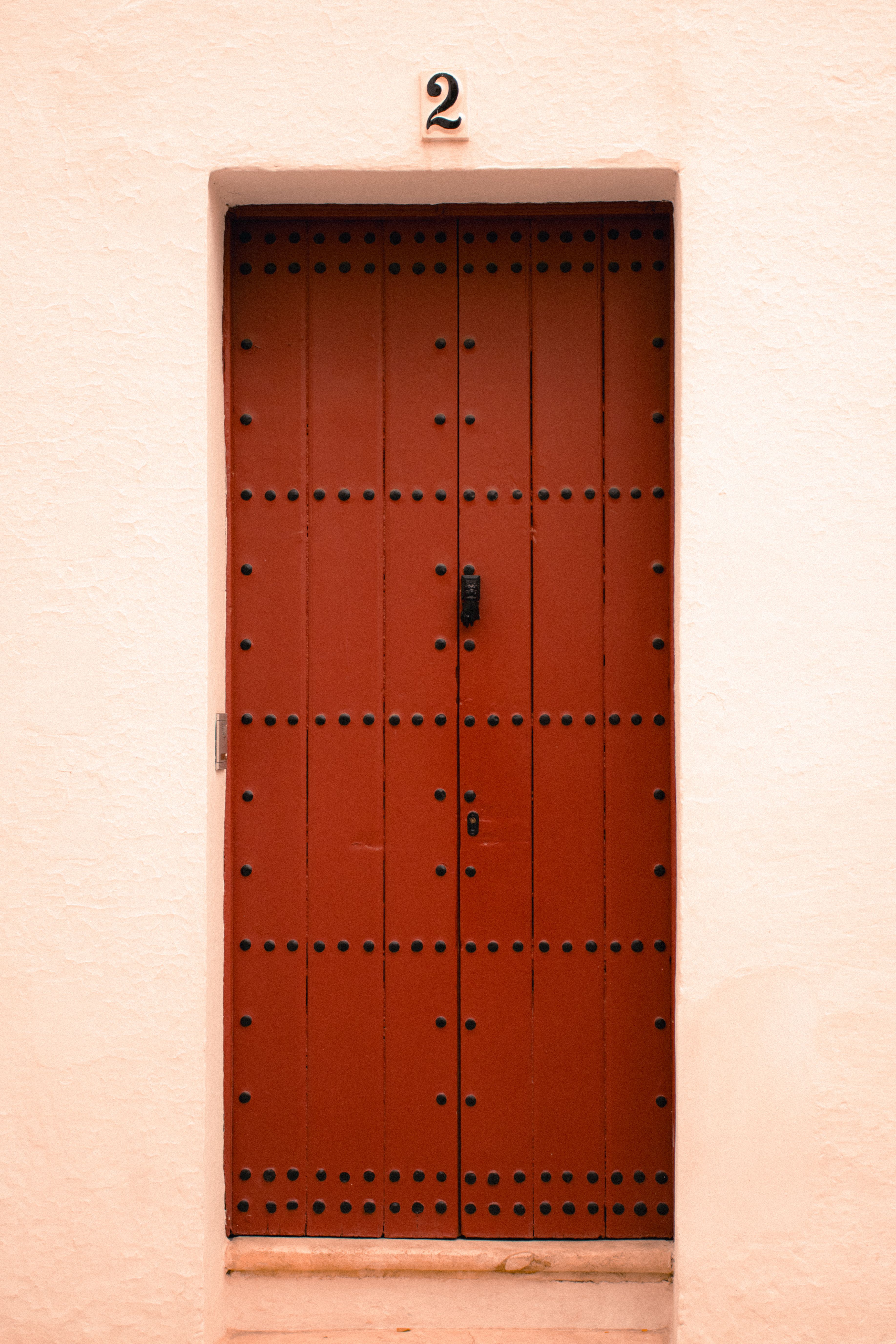 Traditional Spanish Wooden Door in Seville · Free Stock Photo