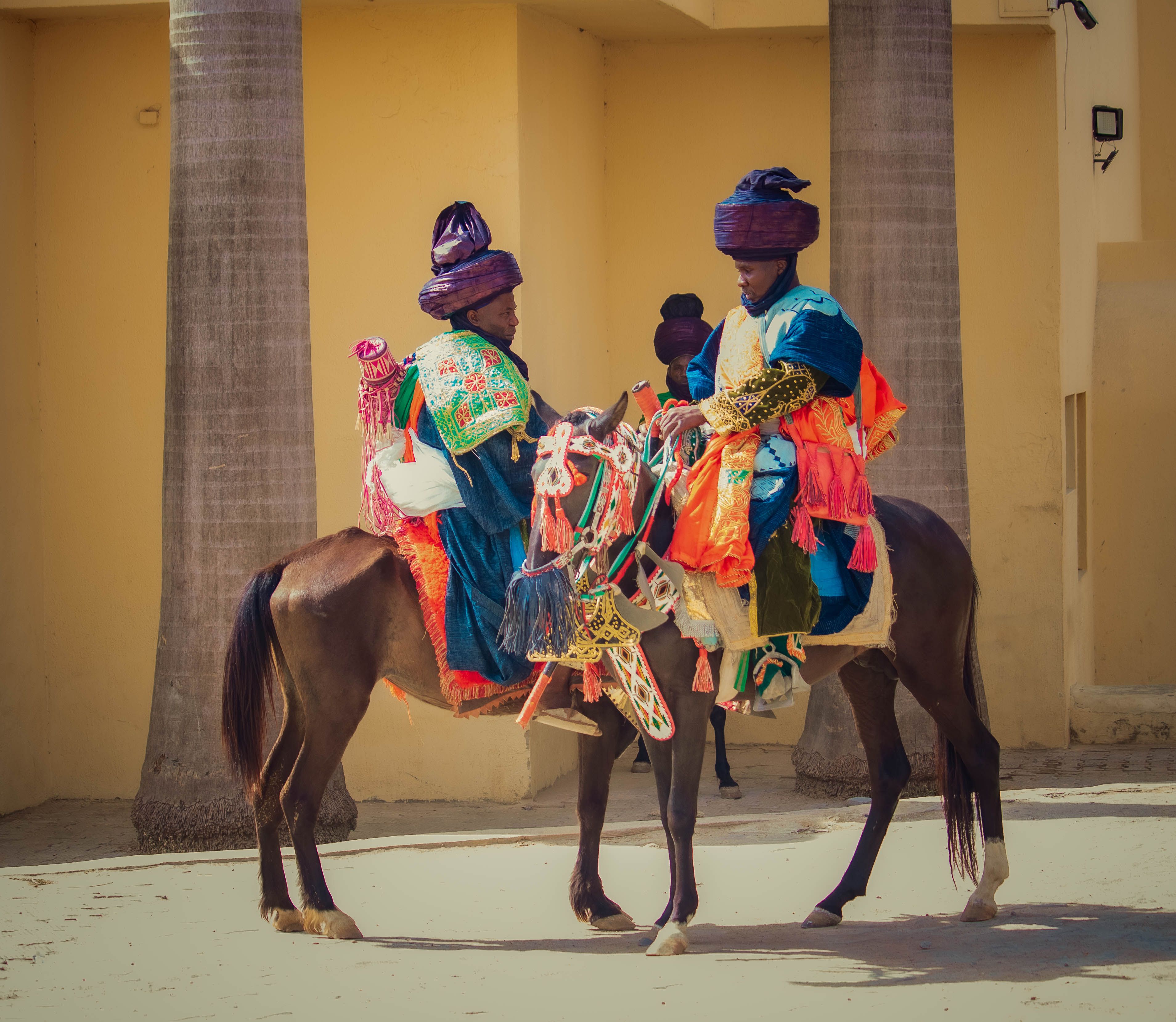 Traditional Horse Riders in Vibrant Regalia · Free Stock Photo