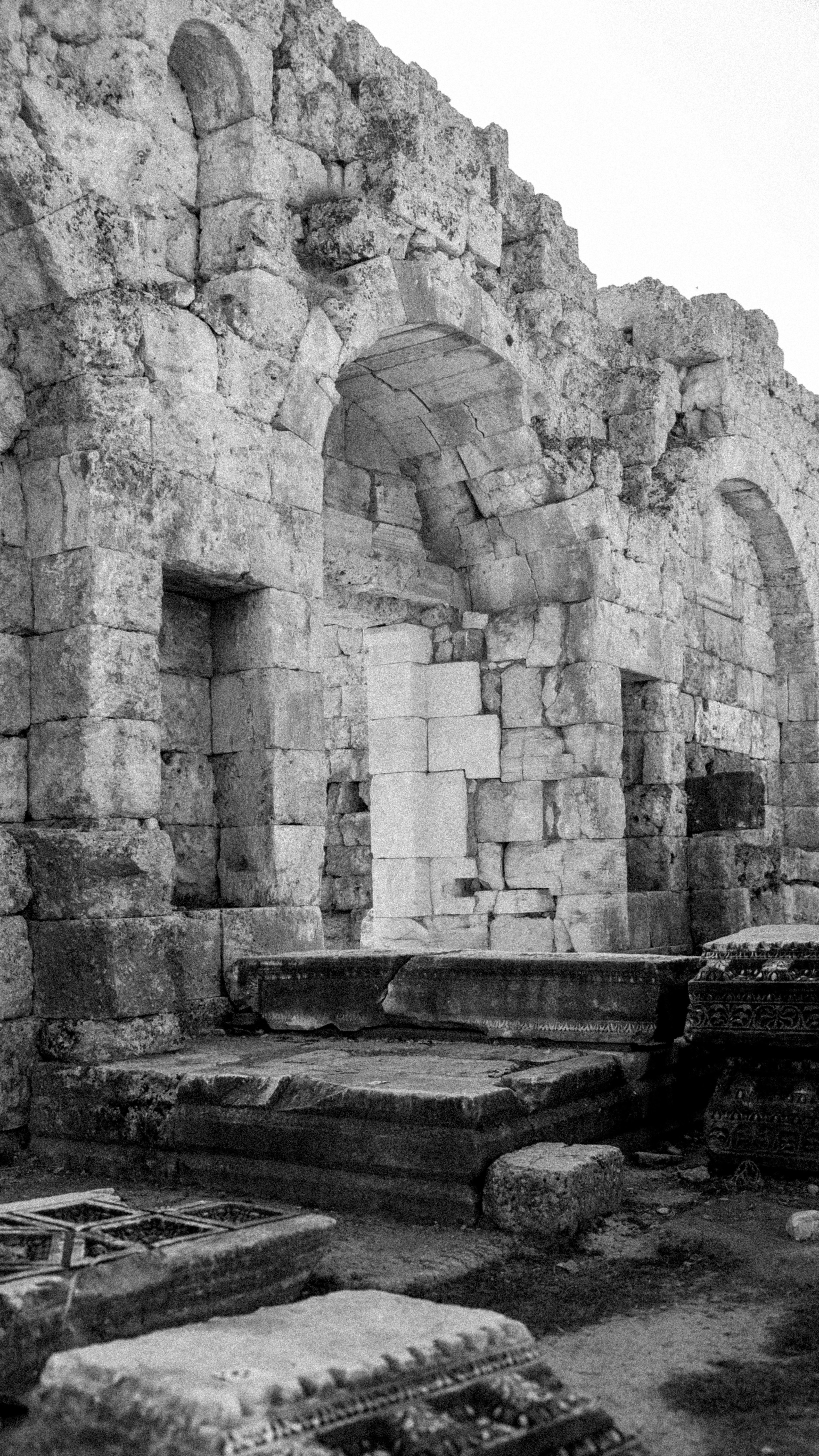 Historic Stone Ruins with Archways in Black and White · Free Stock Photo
