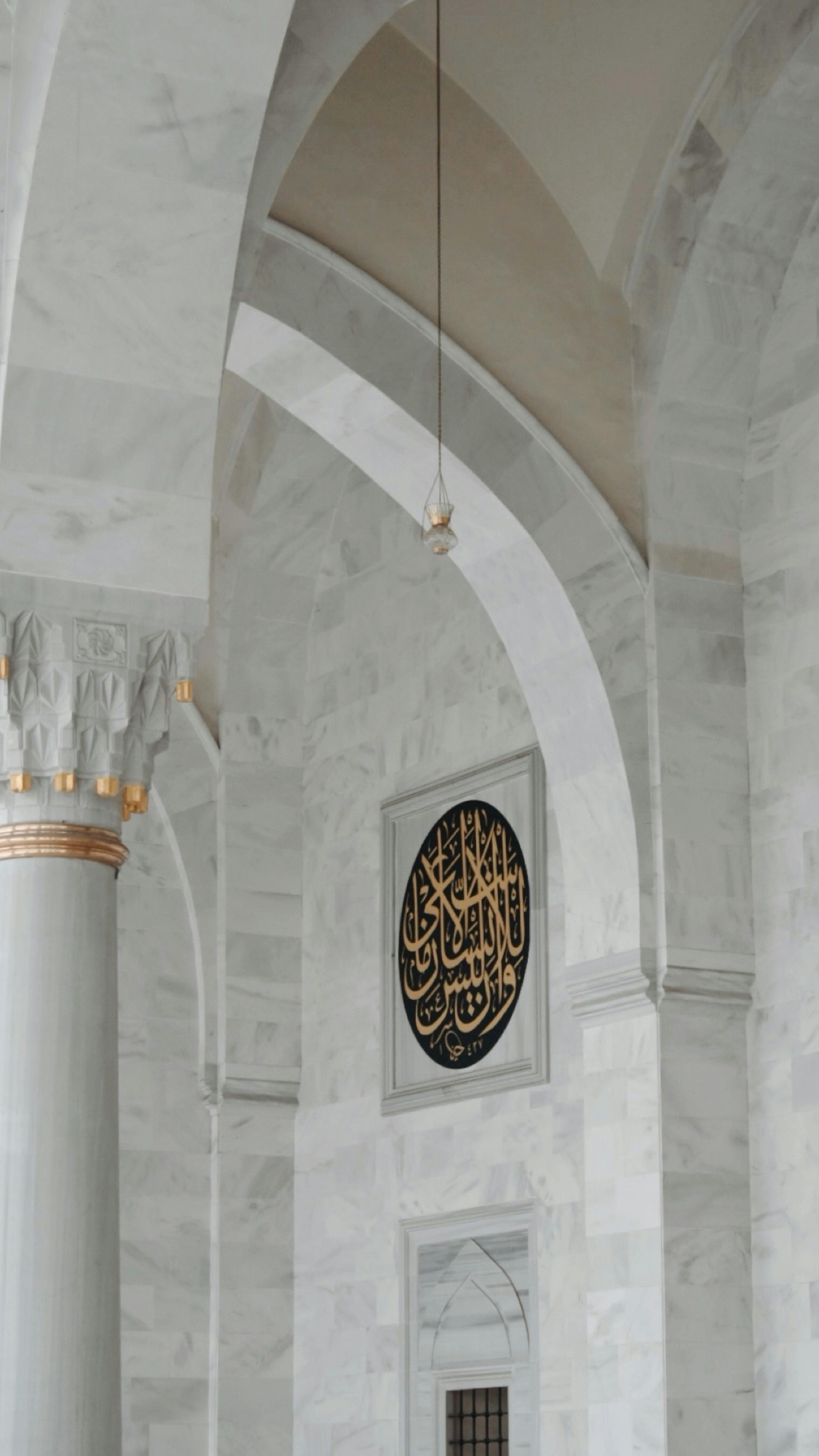 Elegant Marble Mosque Interior with Calligraphy · Free Stock Photo