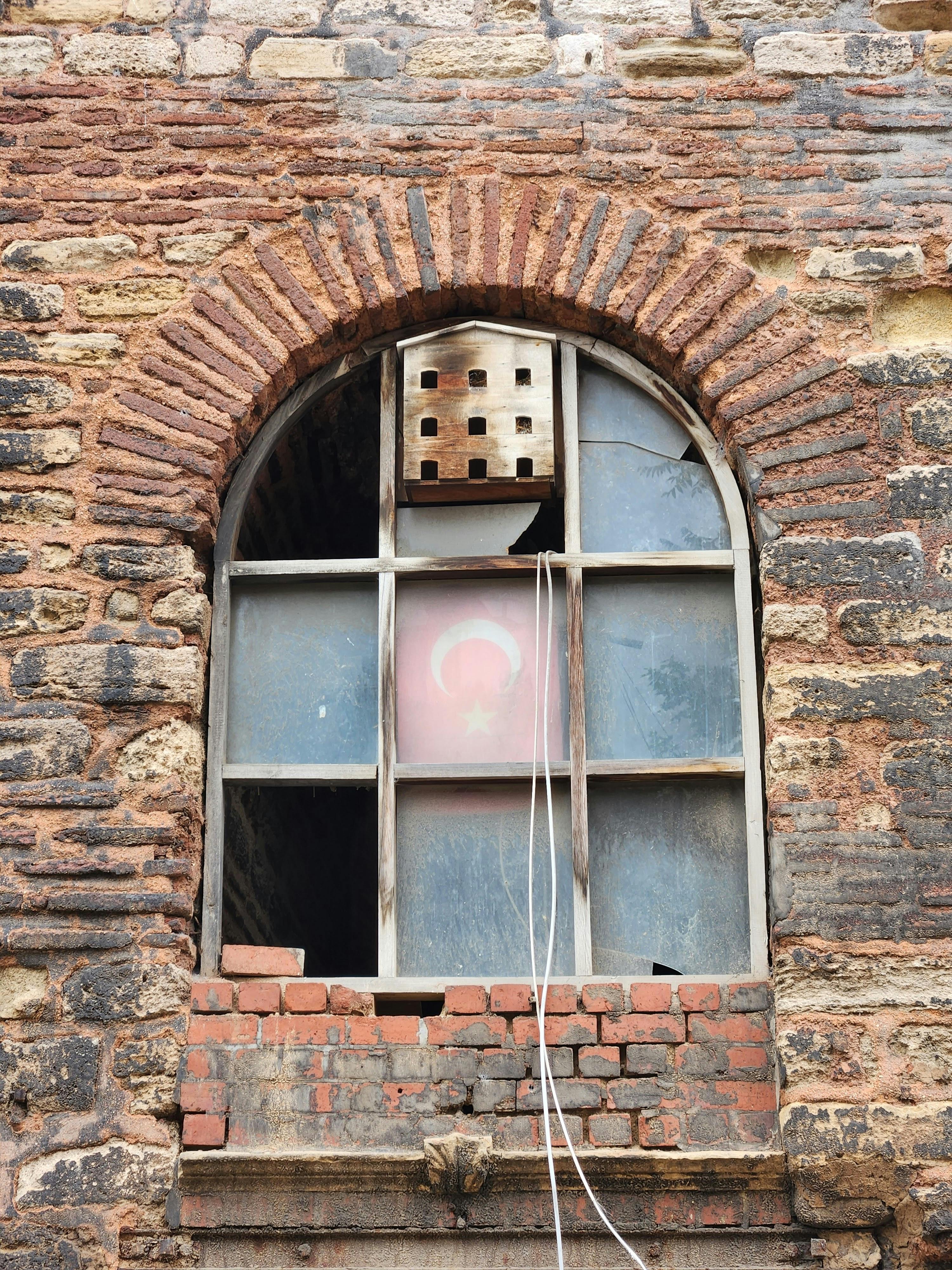 Historic Ottoman Window with Turkish Flag in İstanbul · Free Stock Photo