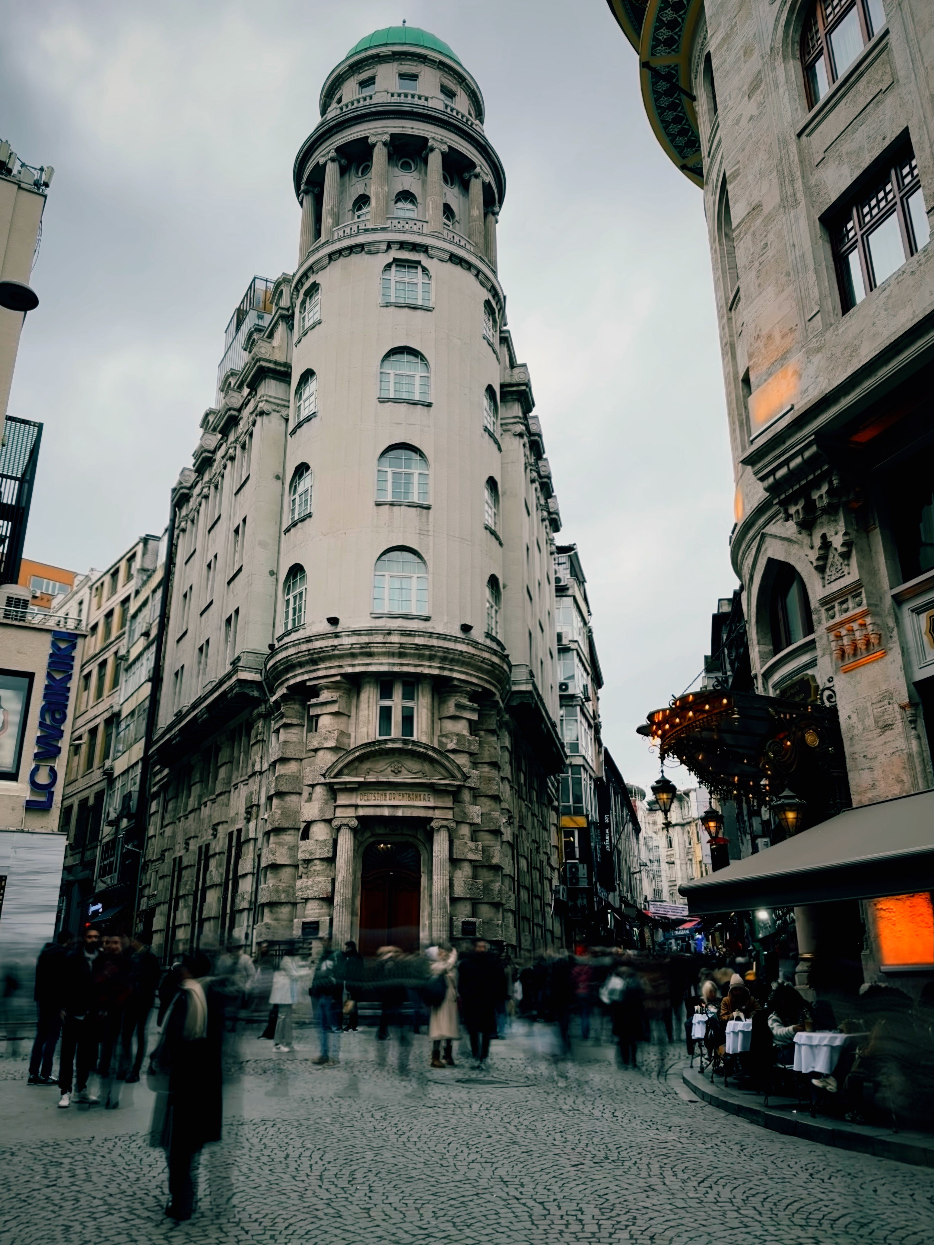 Historic Architectural Building on Busy Street · Free Stock Photo