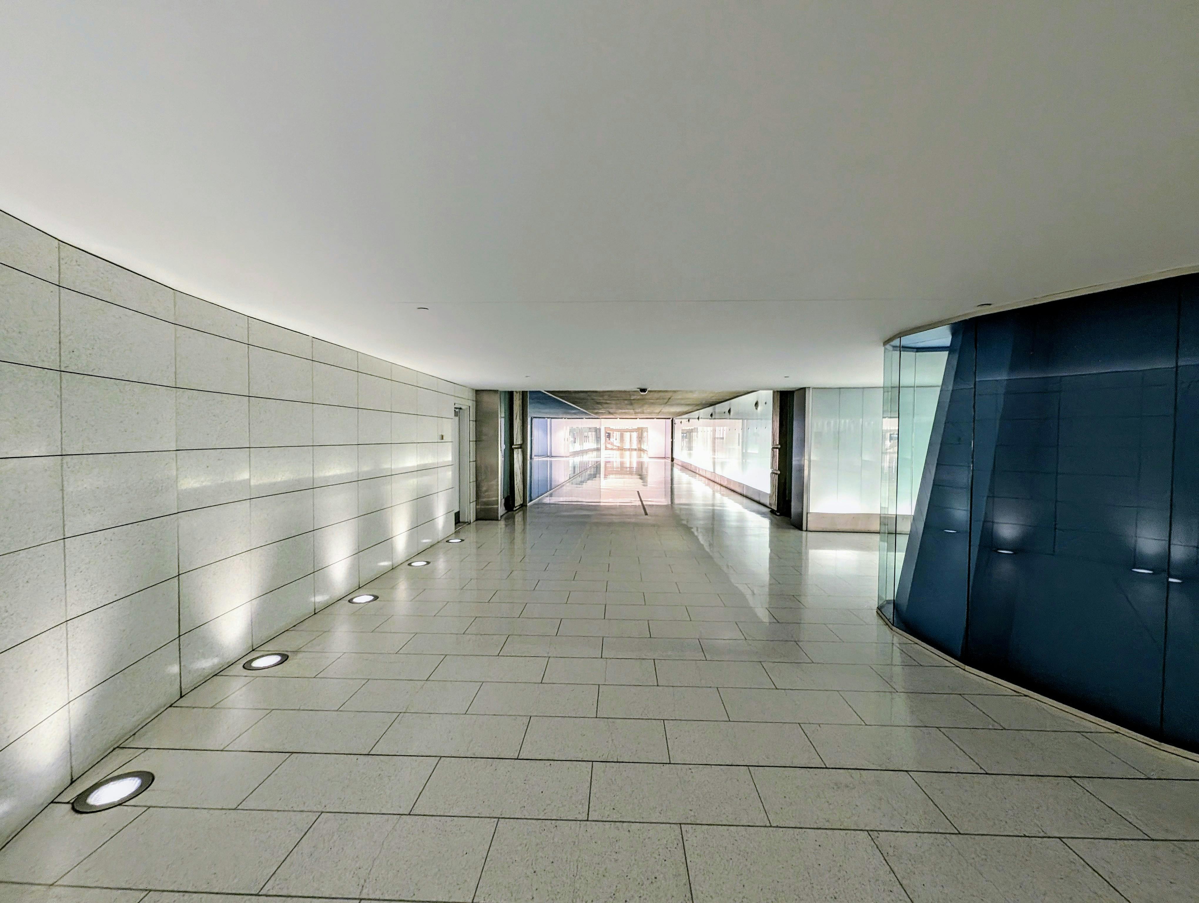 Modern Indoor Corridor with Frosted Glass Walls · Free Stock Photo