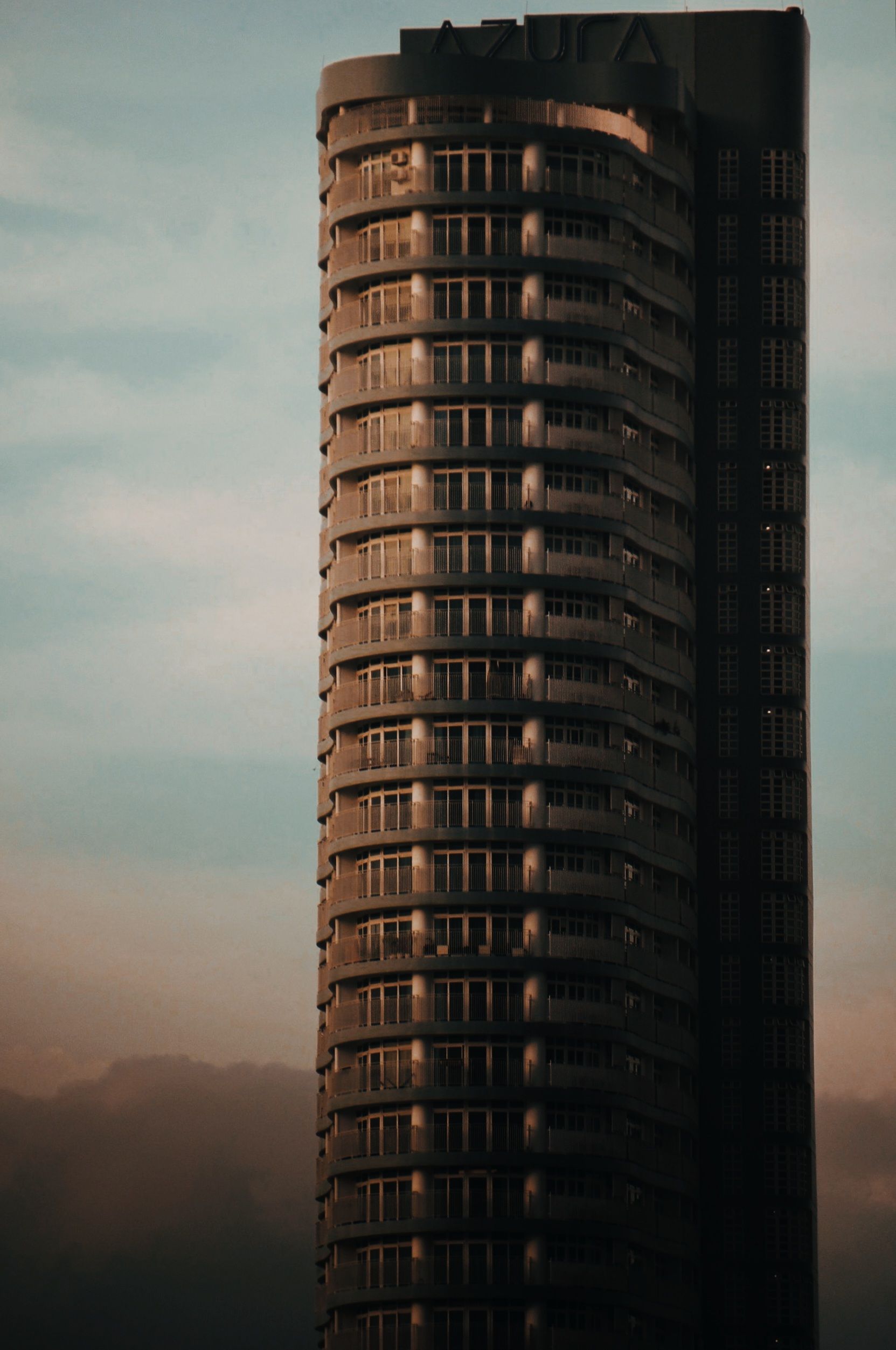 Modern High-Rise Building at Sunset · Free Stock Photo