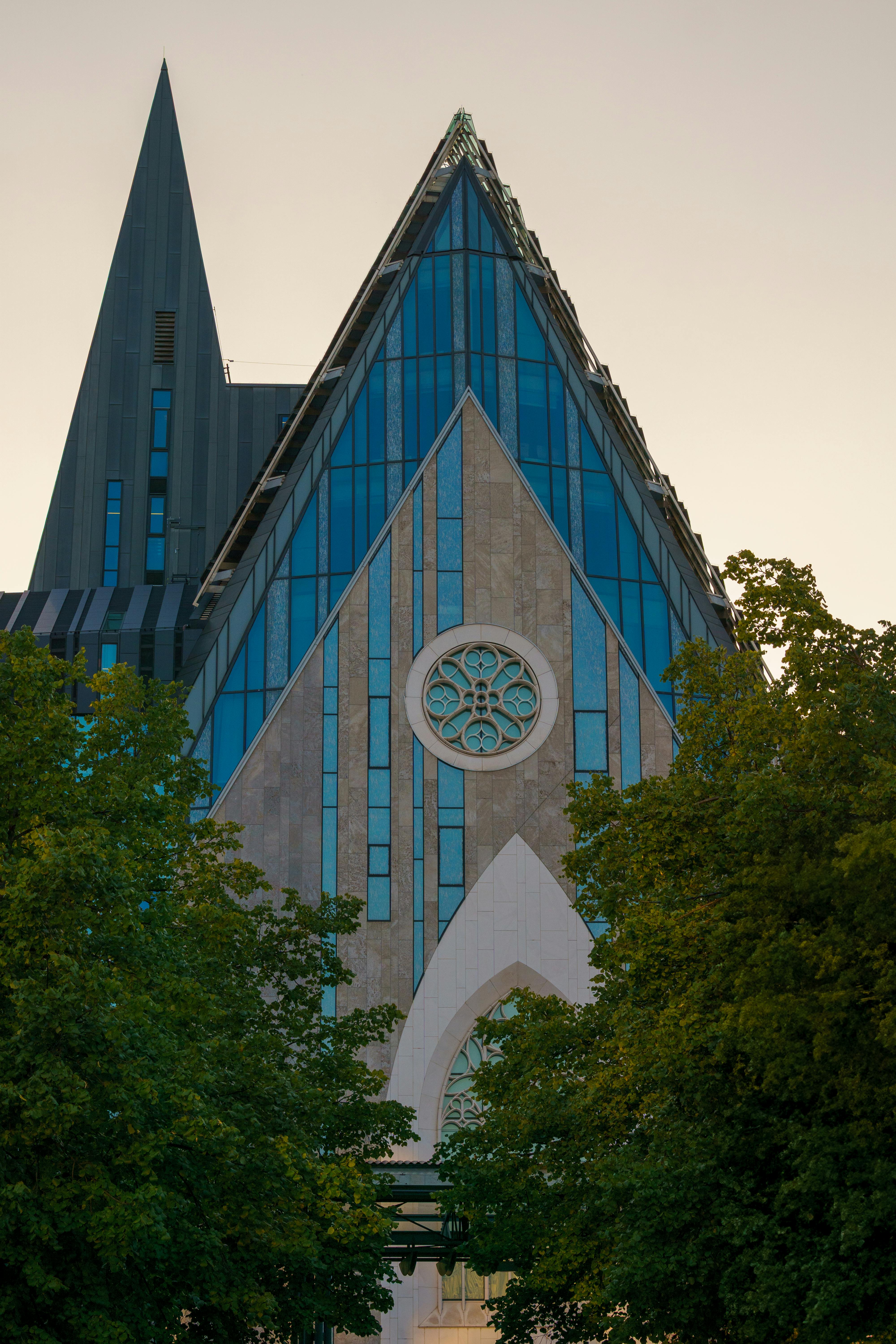 Modern Gothic Architecture with Blue Glass · Free Stock Photo