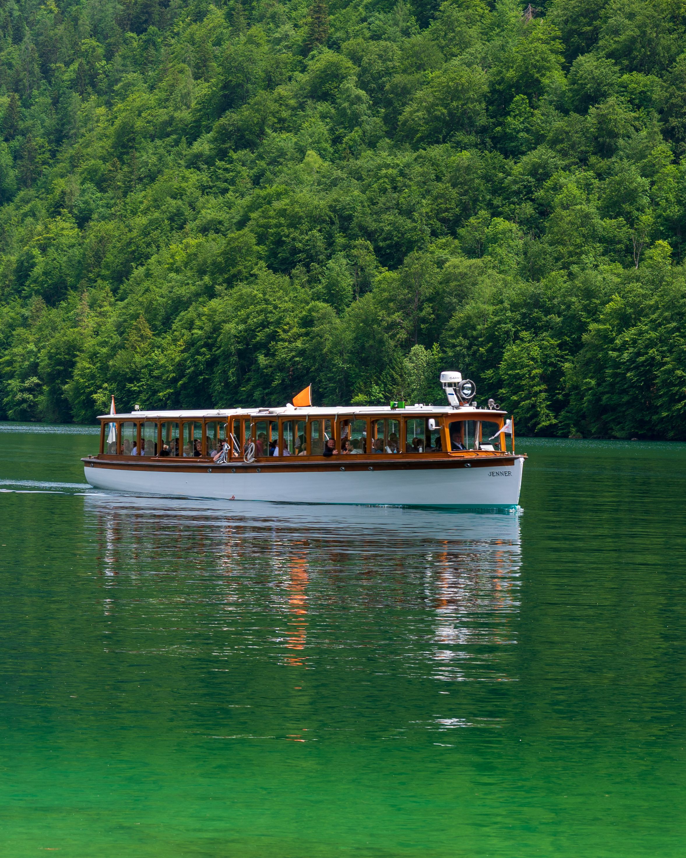 Scenic Boat Ride on a Pristine Mountain Lake · Free Stock Photo
