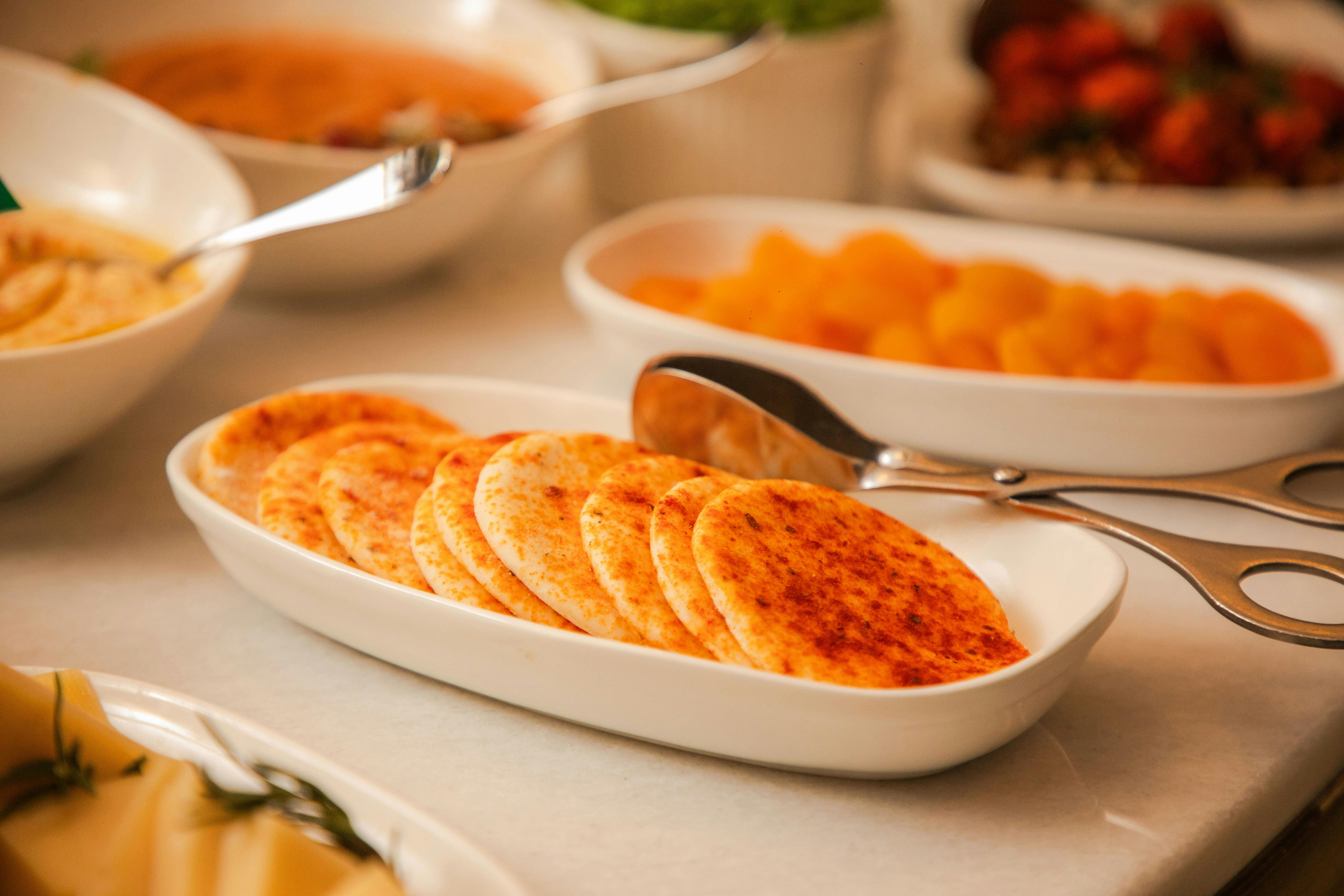 Delicious Plated Appetizers on a Buffet Table · Free Stock Photo