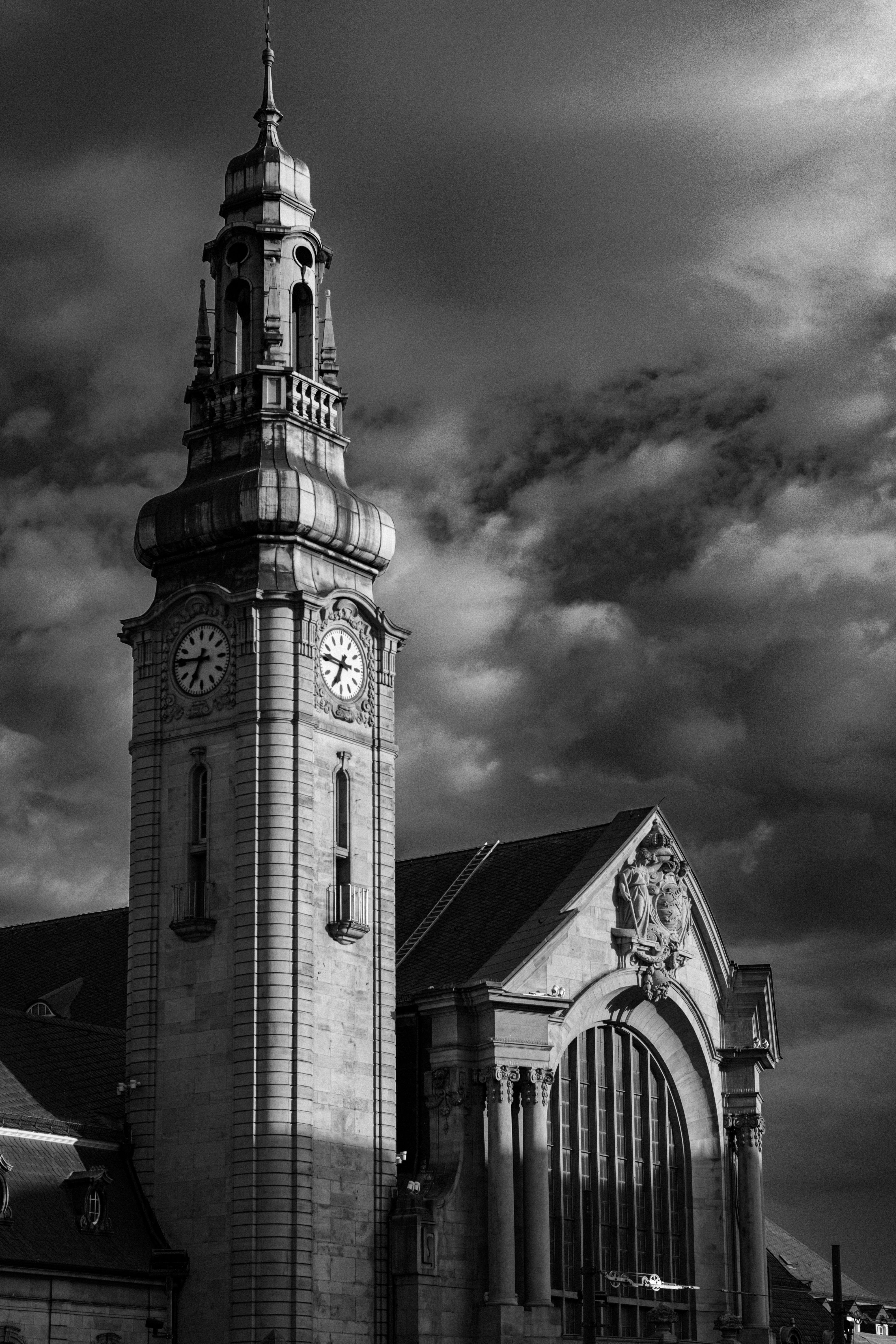 Gothic Clock Tower with Dramatic Clouds in Black and White · Free Stock ...