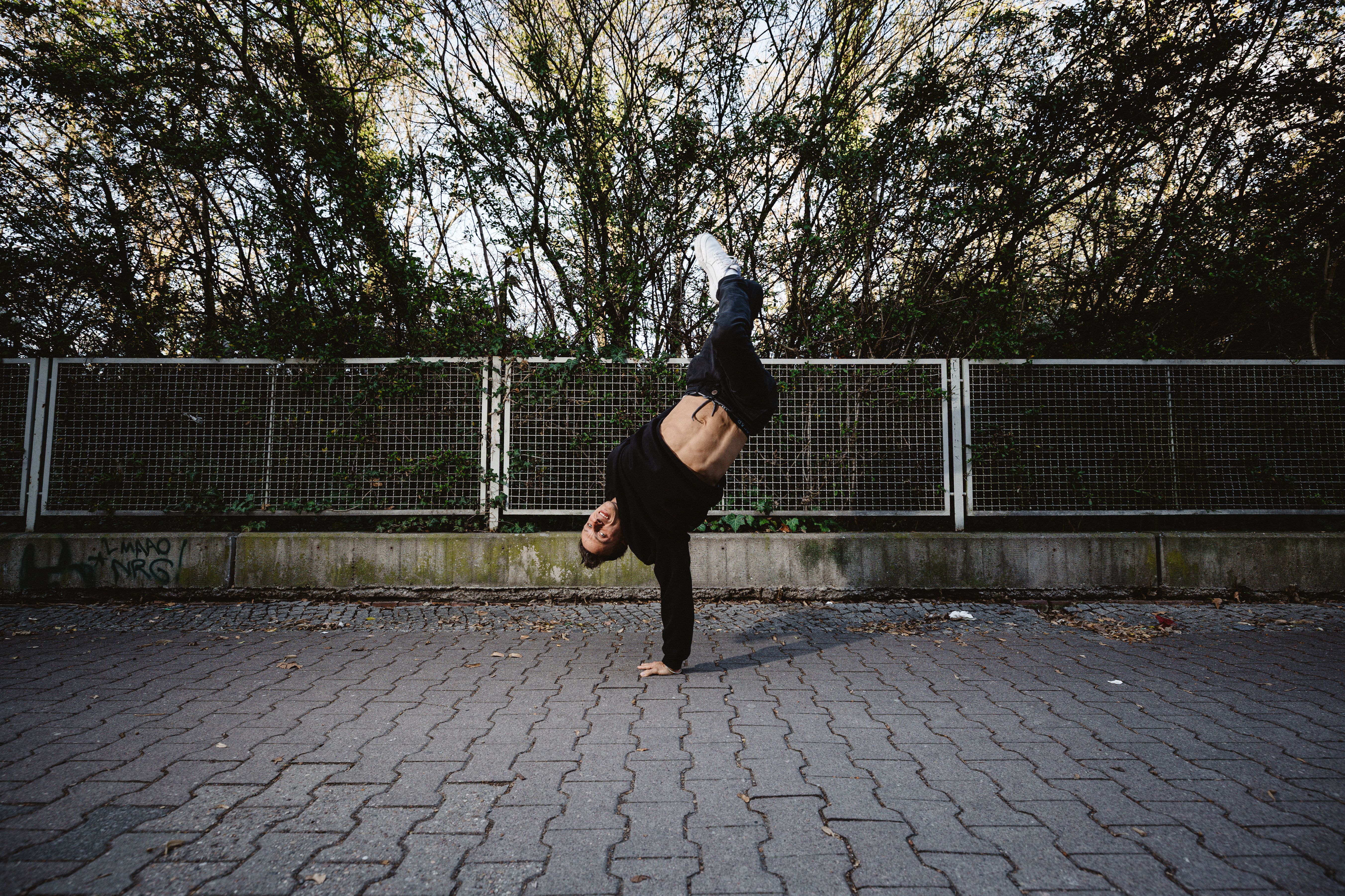 Street Dancer Performing Handstand in Berlin · Free Stock Photo