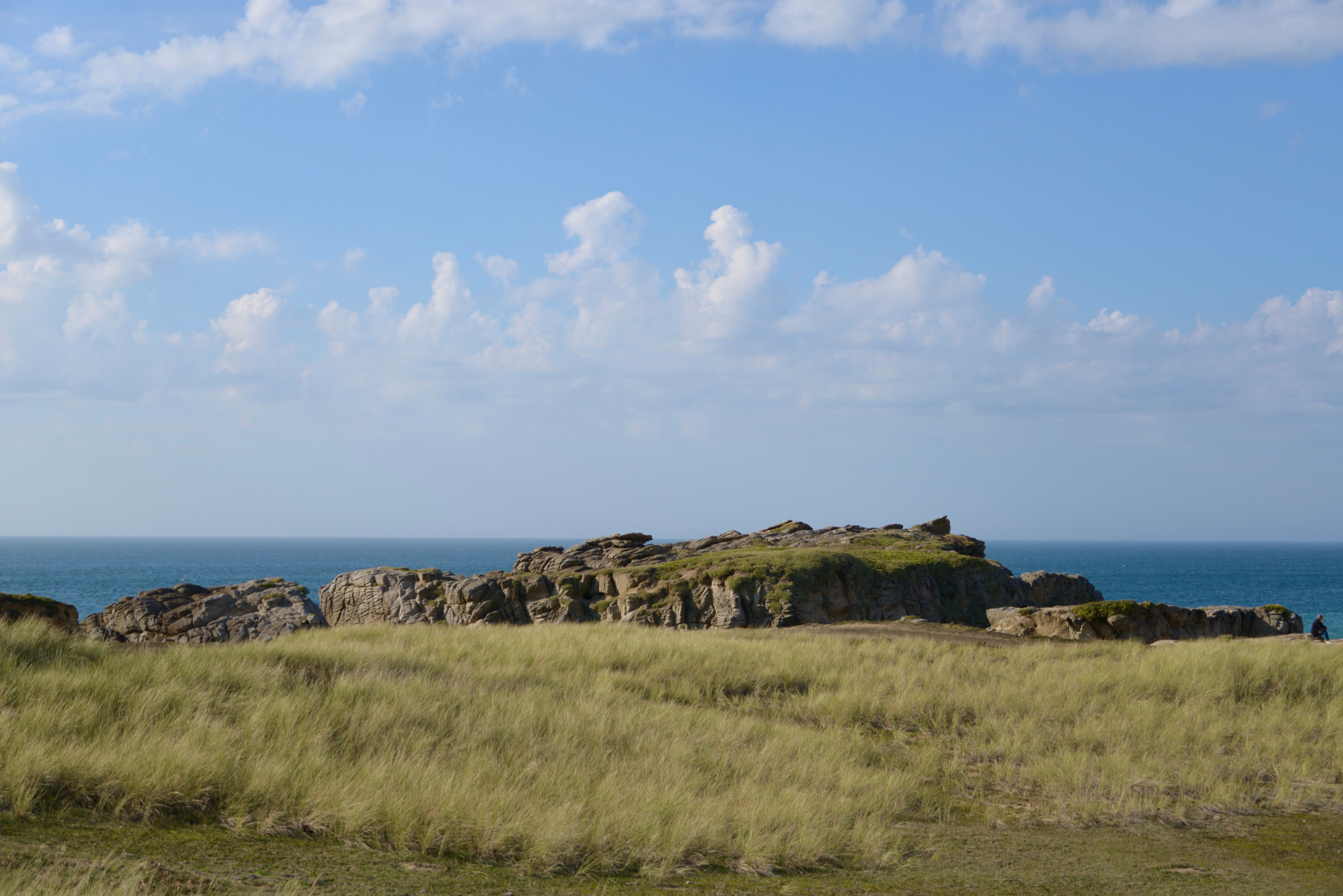 Scenic Coastal Landscape with Rocky Outcrop · Free Stock Photo