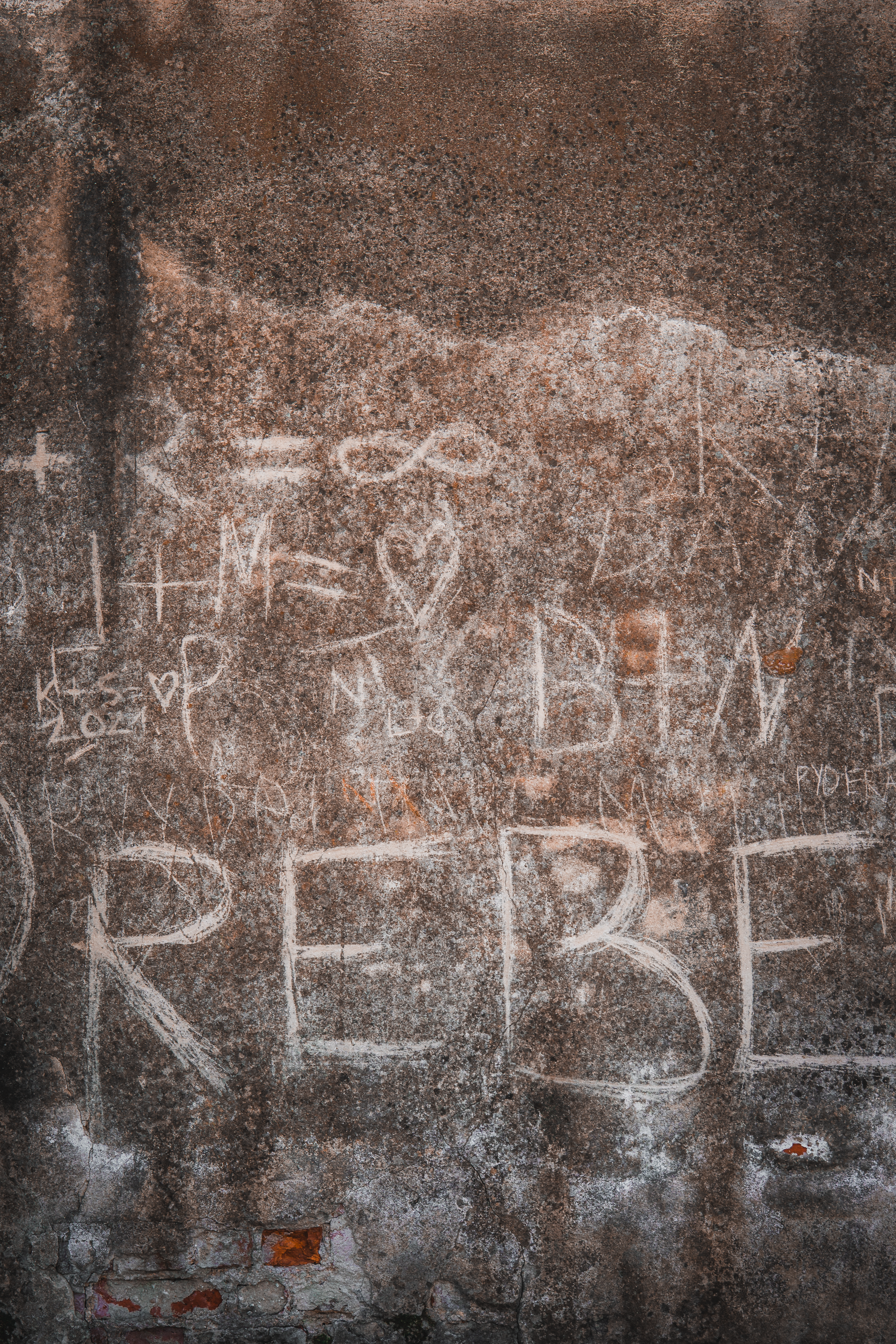 Weathered Wall with Chalk Graffiti Art · Free Stock Photo