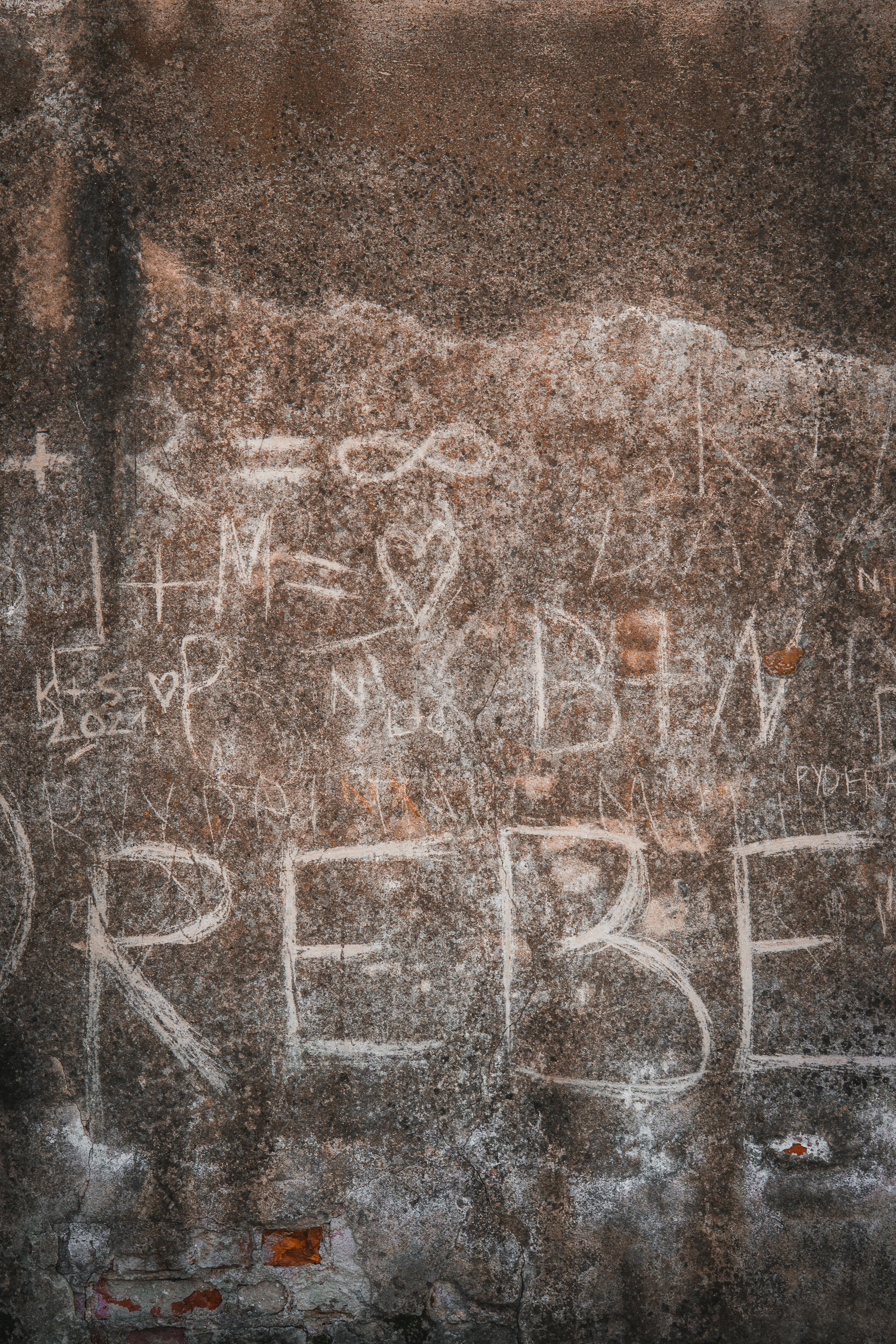 Weathered Wall with Chalk Graffiti Art · Free Stock Photo