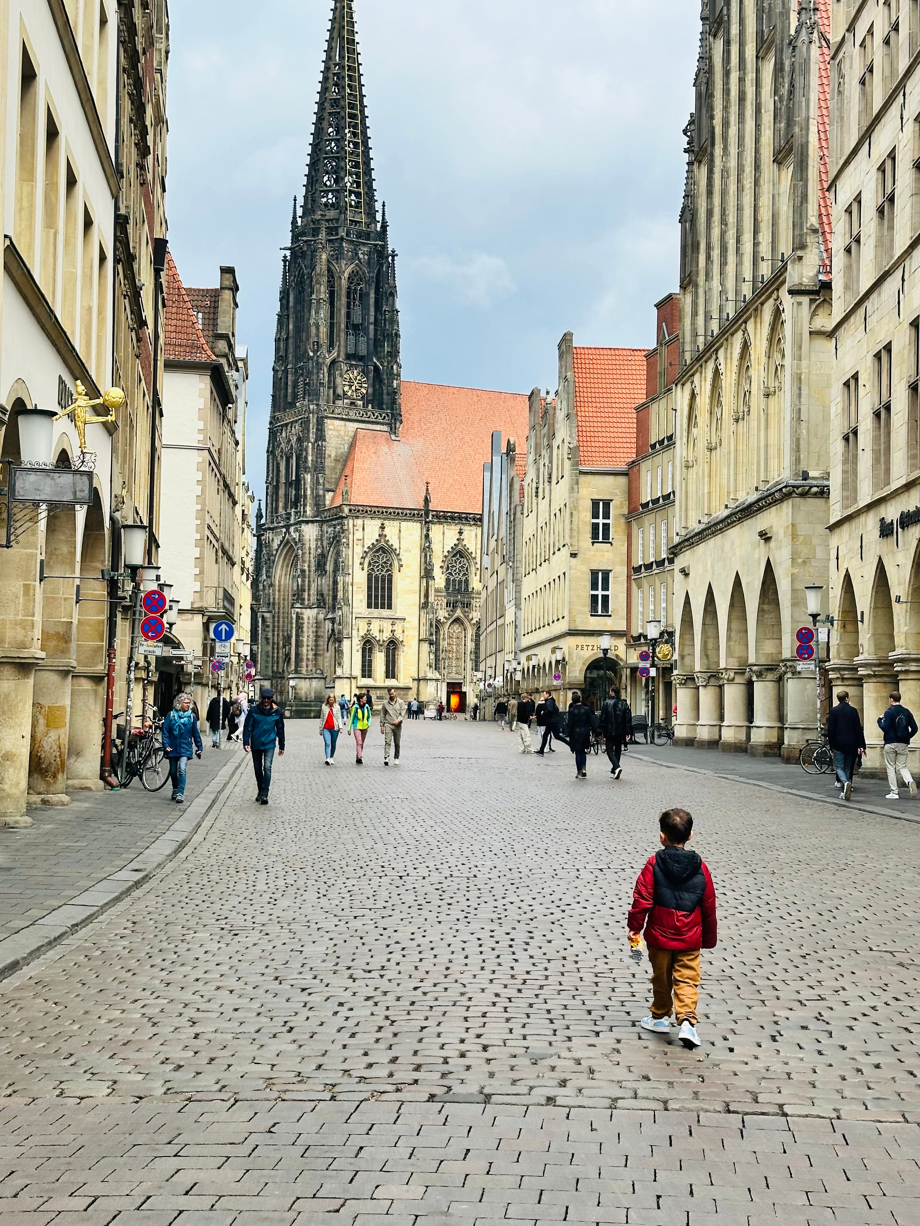 Child Walking Towards Historic Cathedral Front · Free Stock Photo
