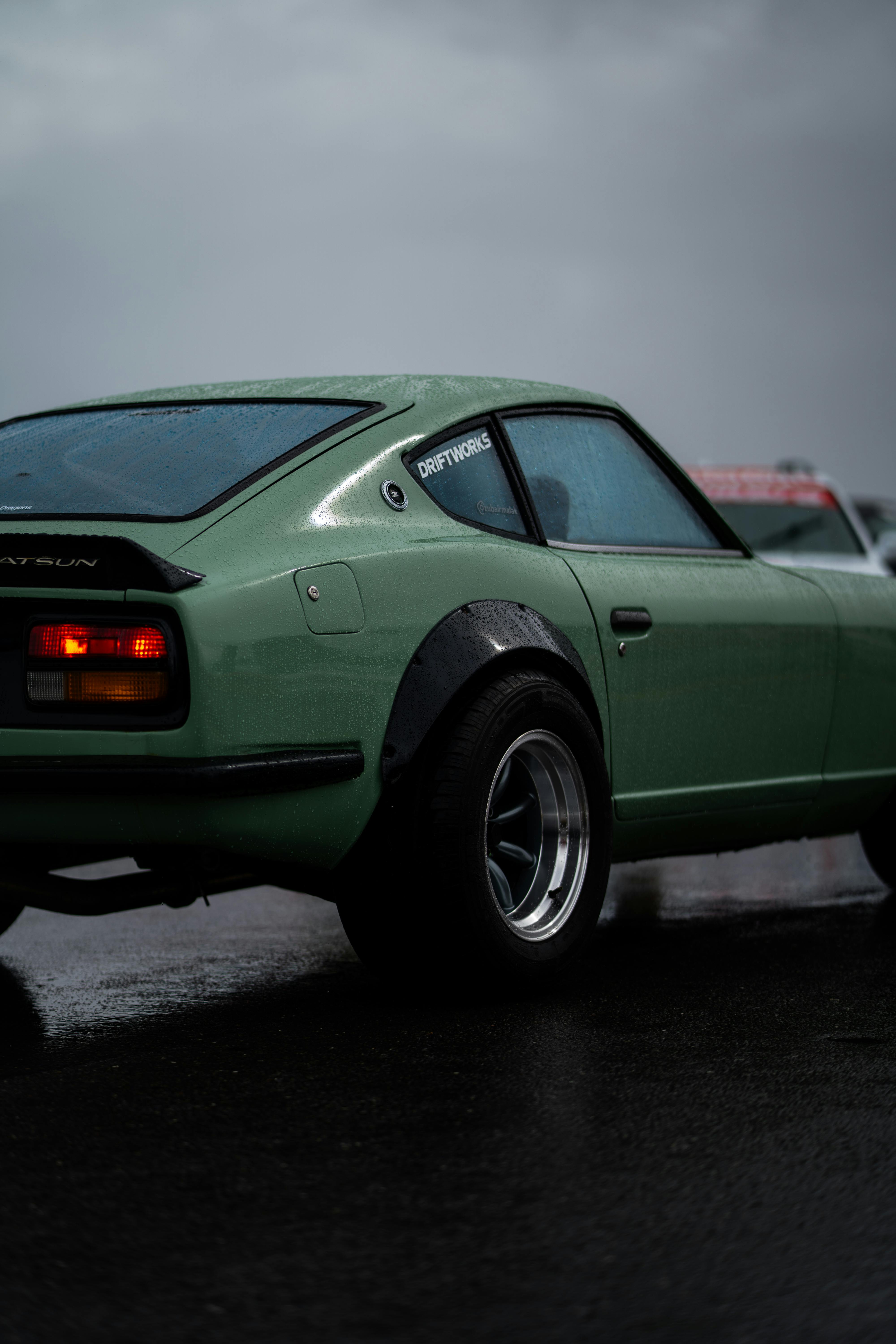 Classic Mint Green Datsun 240Z in Rain · Free Stock Photo