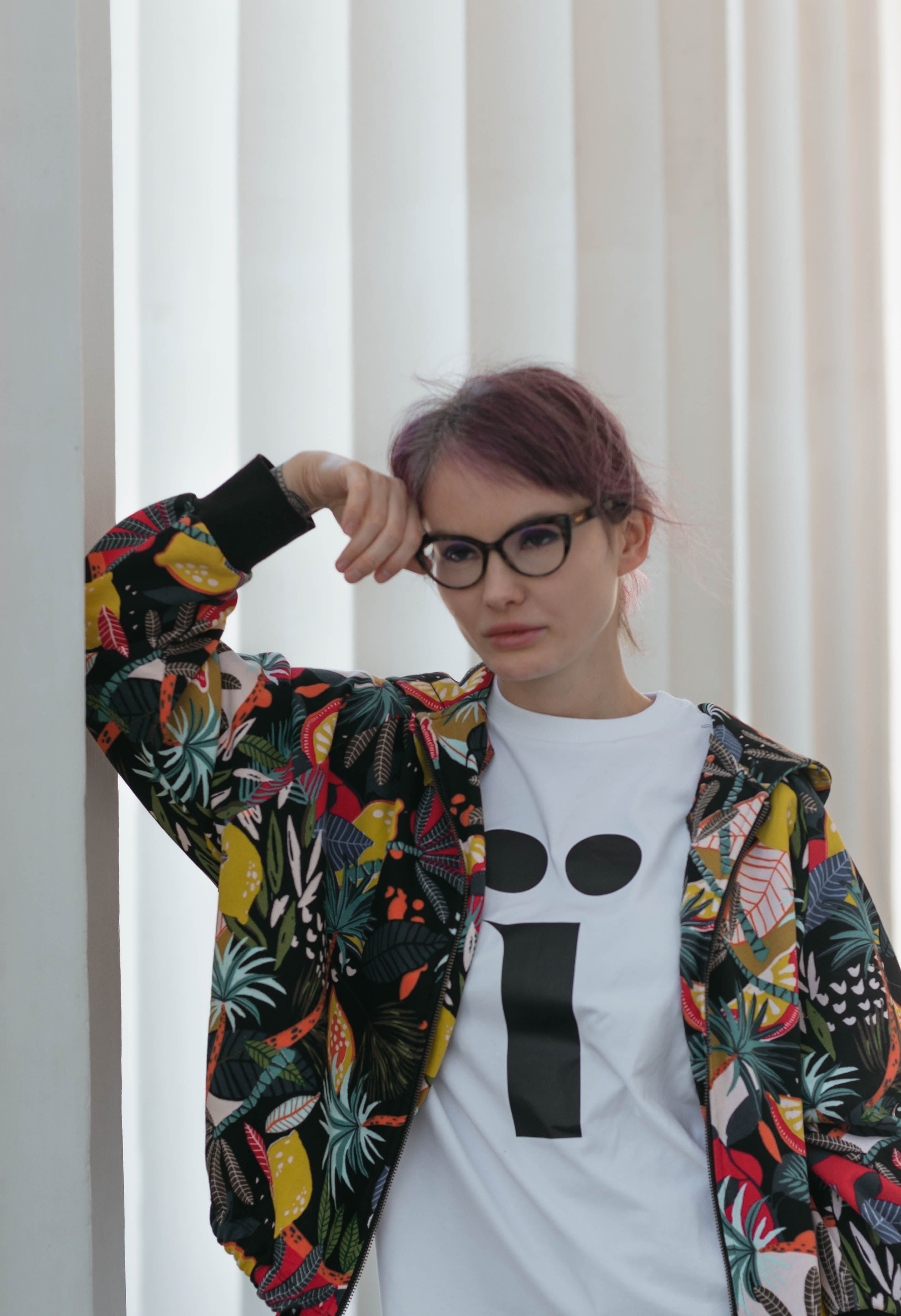 Fashionable Woman Posing in Colorful Jacket · Free Stock Photo