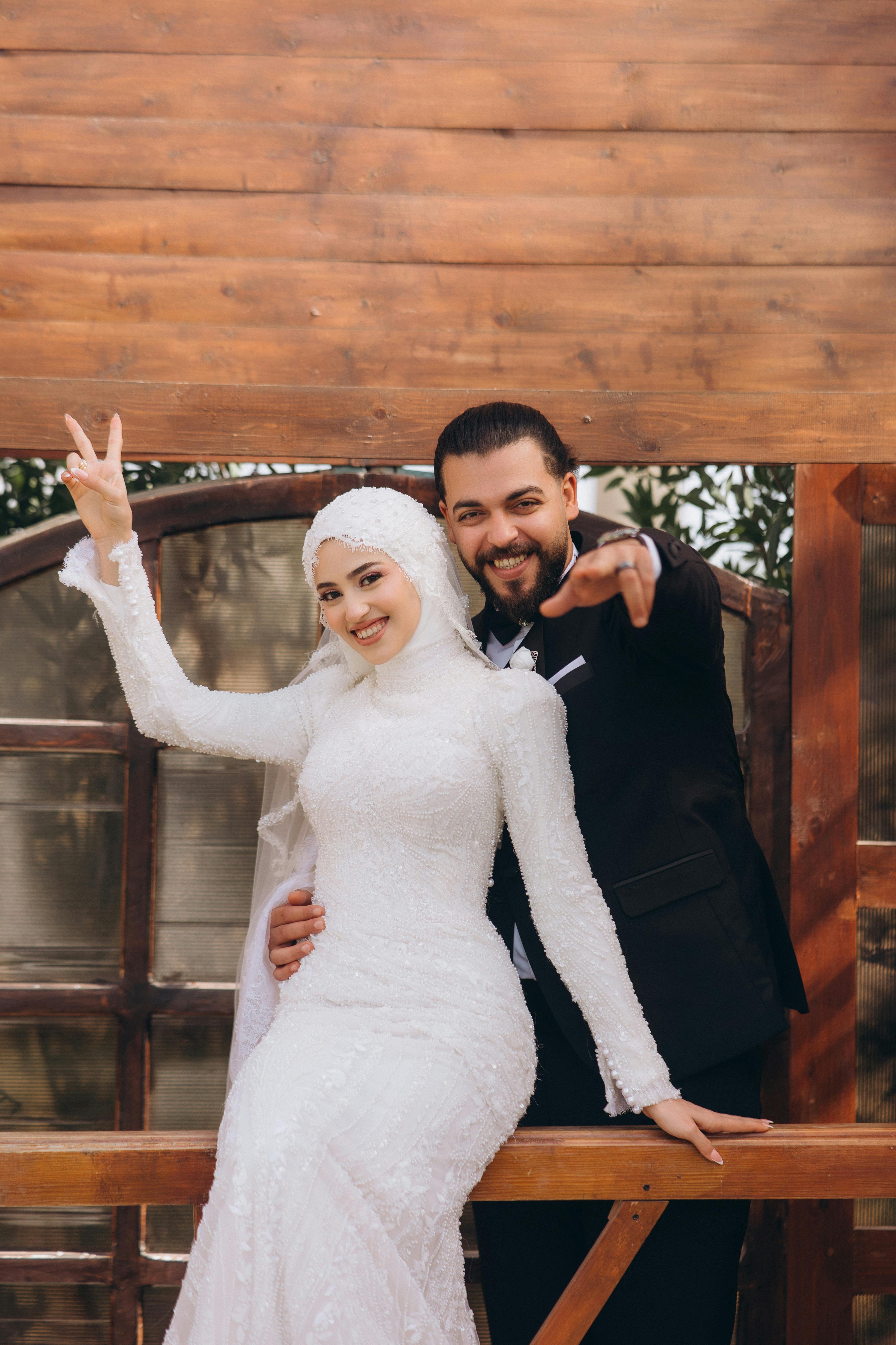 Smiling Muslim Couple Celebrating Wedding Day · Free Stock Photo