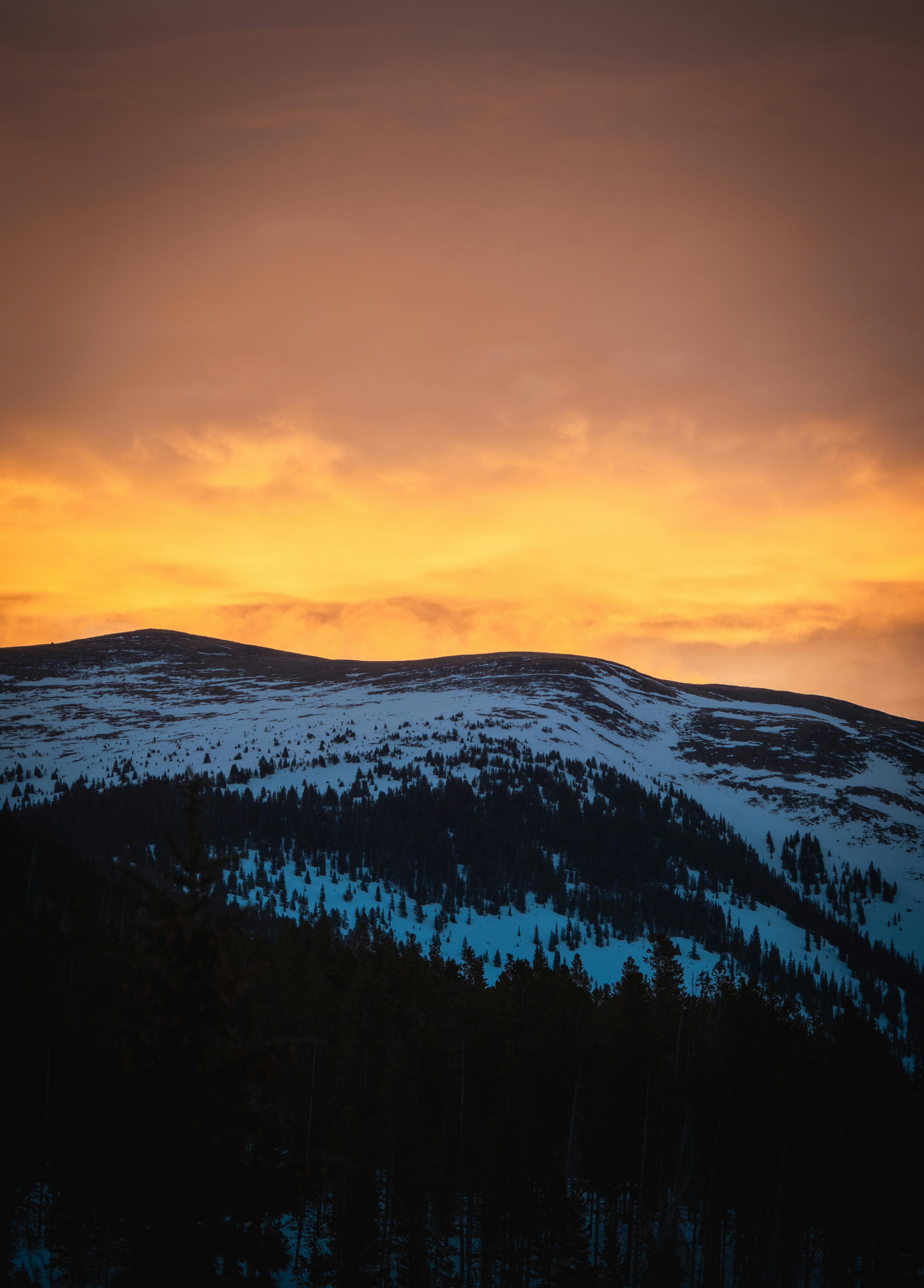 Stunning Mountain Sunset Over Snowy Peaks · Free Stock Photo