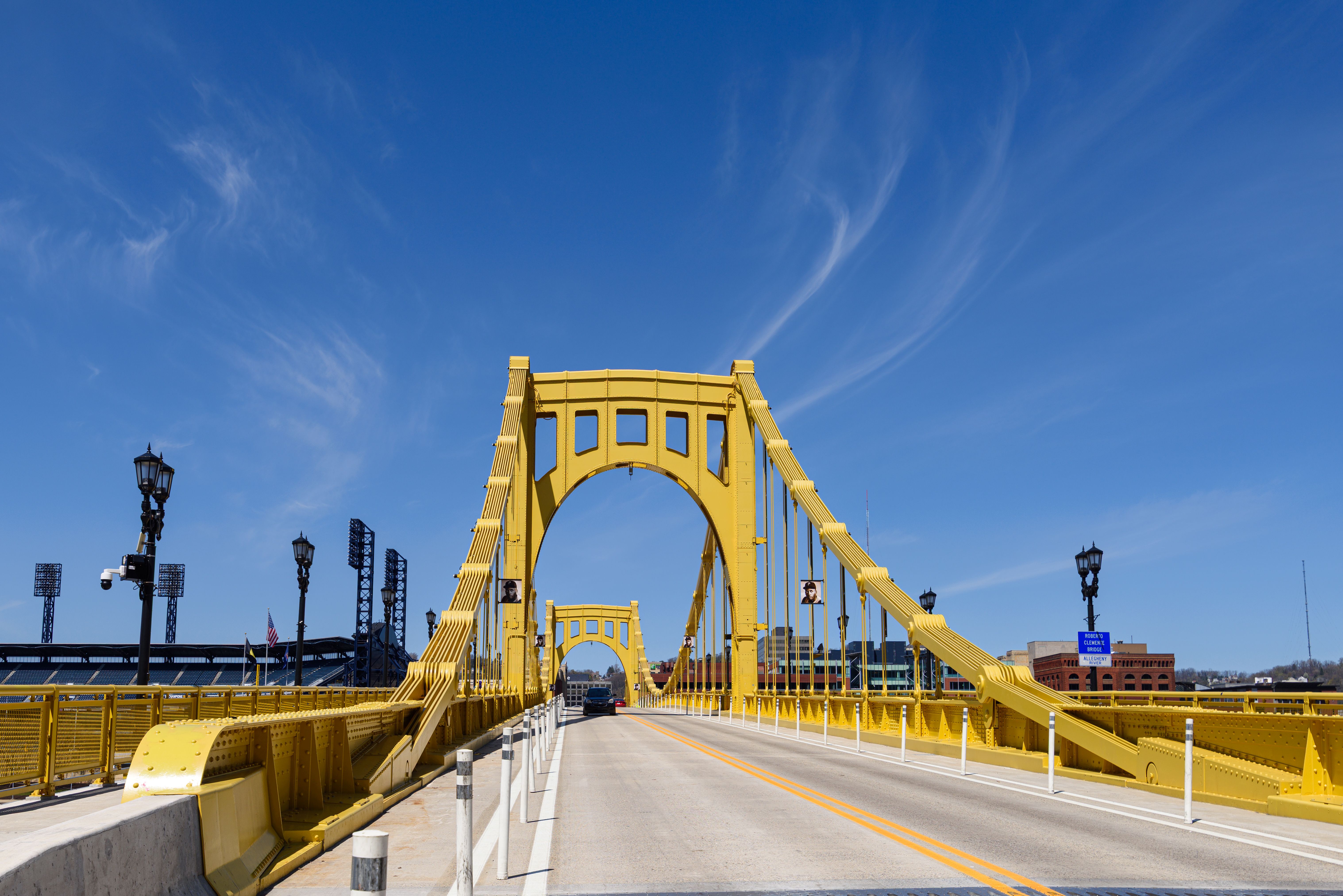 Iconic Yellow Bridge in Pittsburgh's Clear Sky · Free Stock Photo