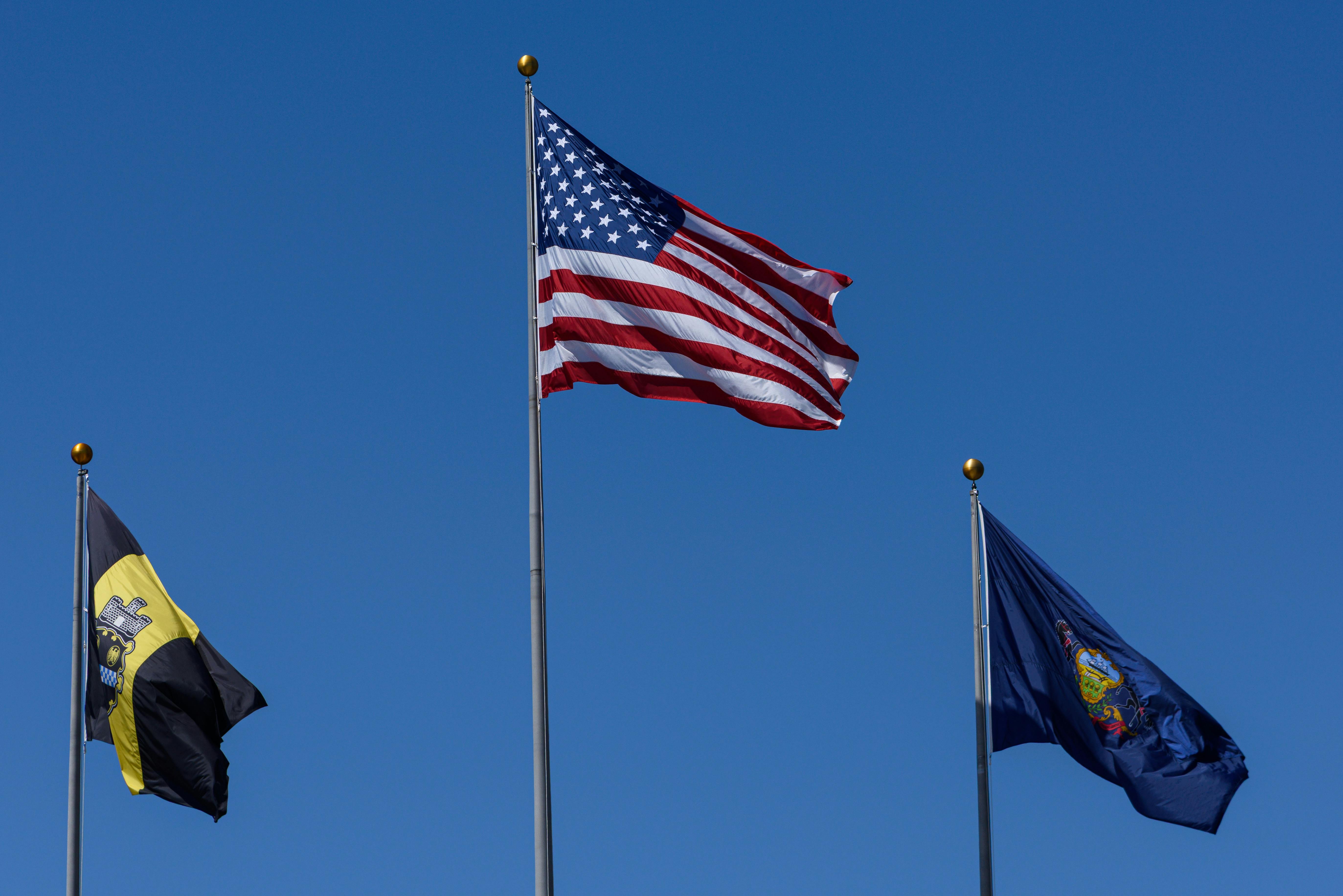 American Flag and Two State Flags Waving in the Sky · Free Stock Photo
