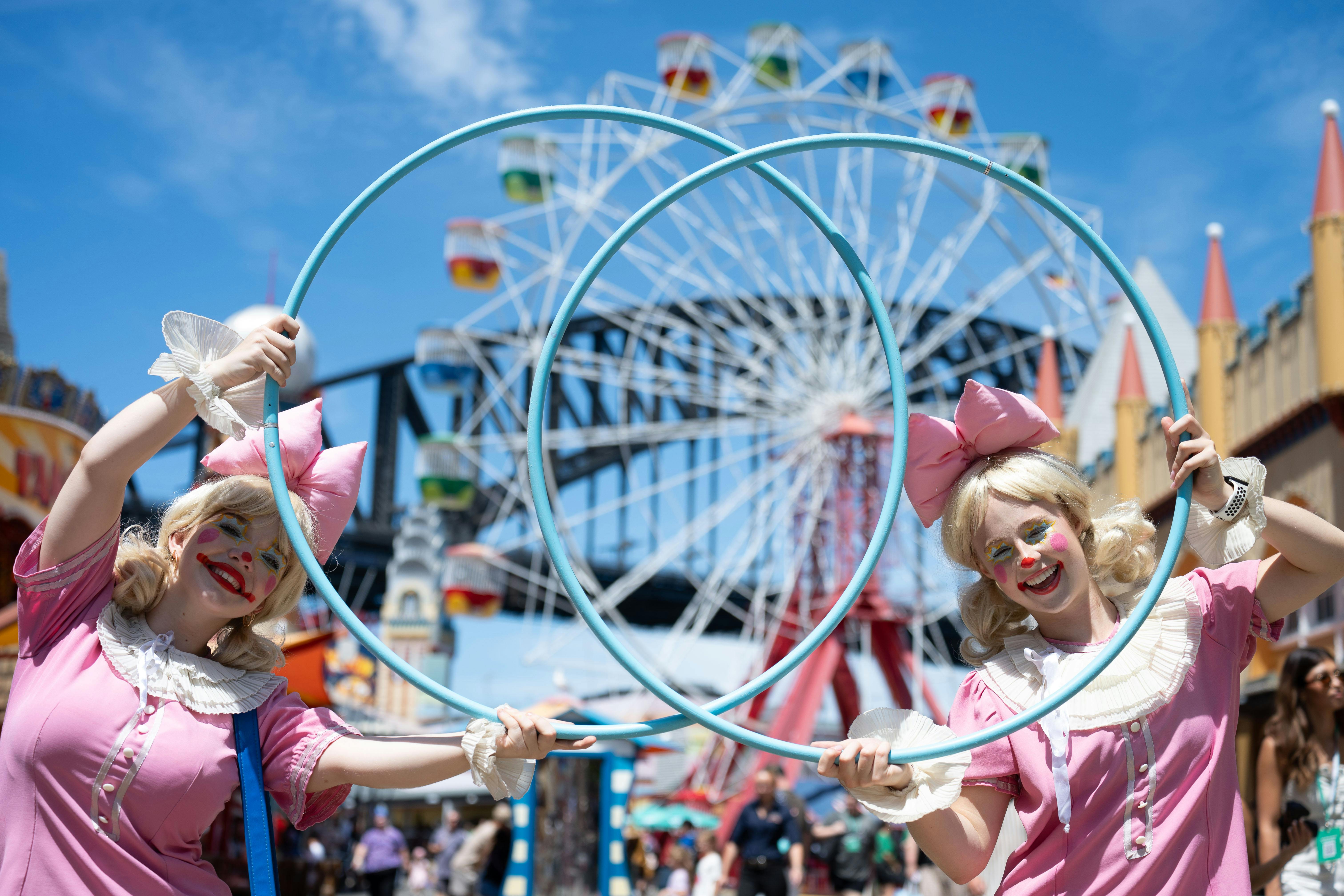 Colorful Carnival Entertainment with Clowns · Free Stock Photo