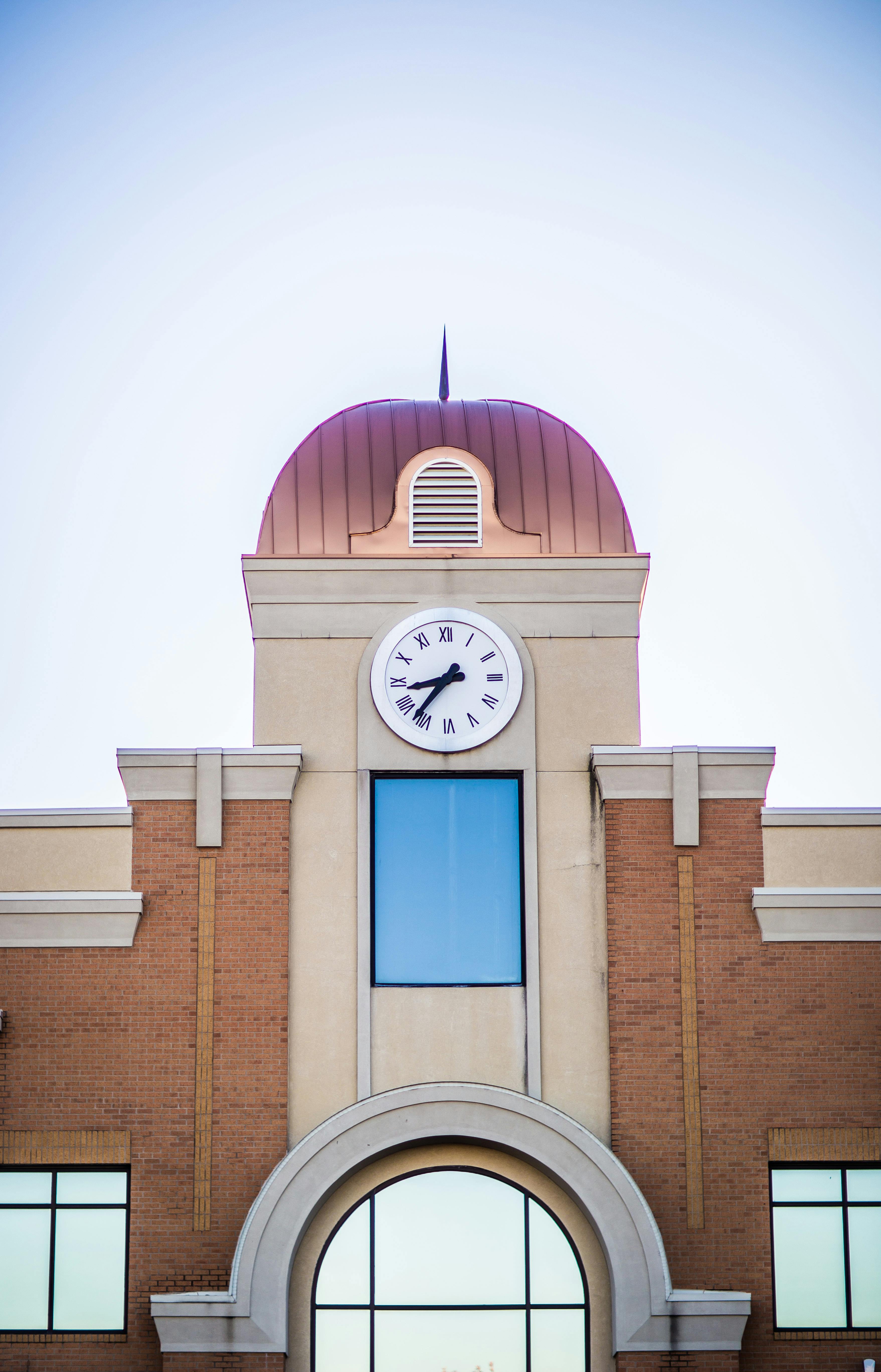 Photo of Clock on Concrete Building · Free Stock Photo