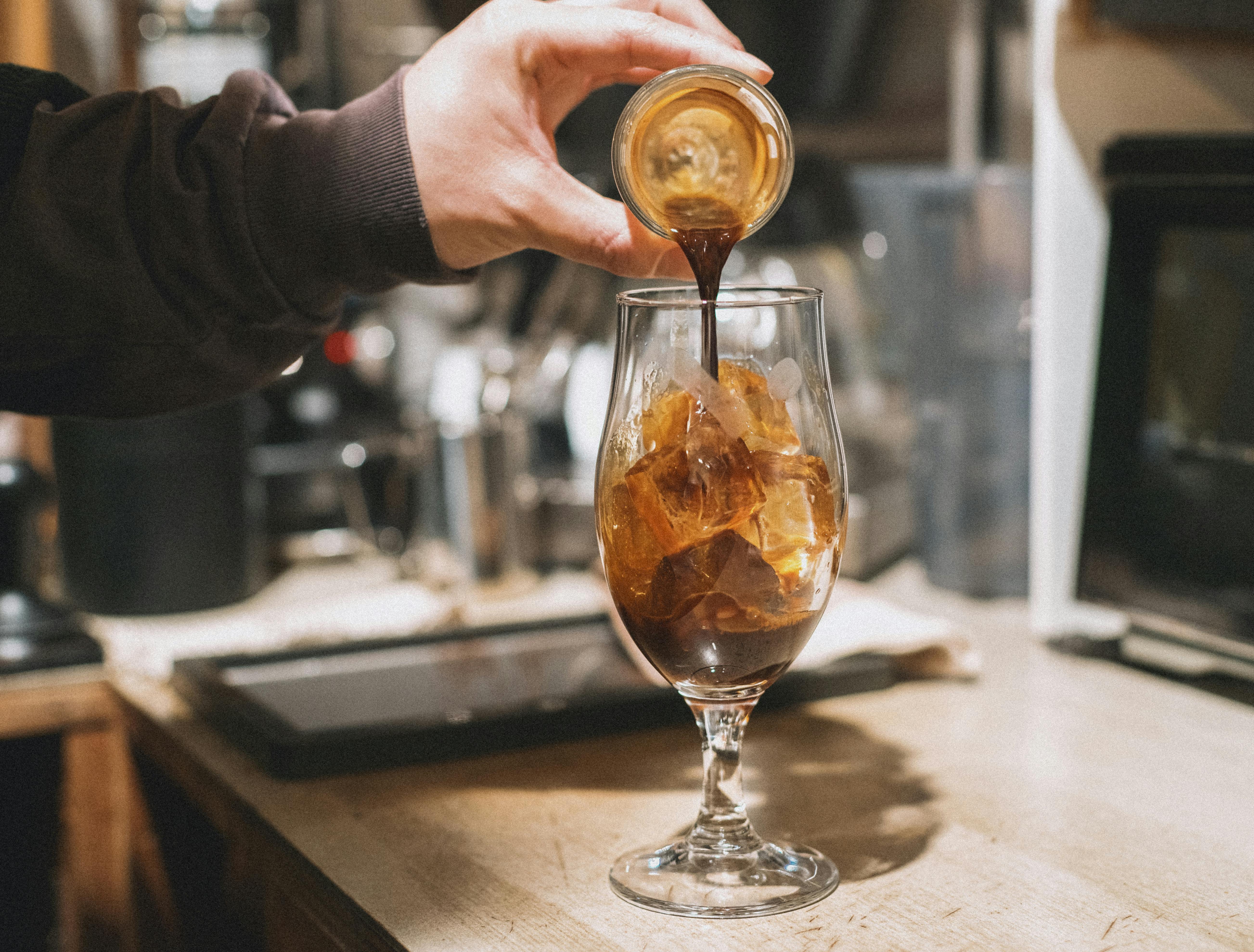 Pouring Espresso Over Ice in Shinjuku Cafe · Free Stock Photo