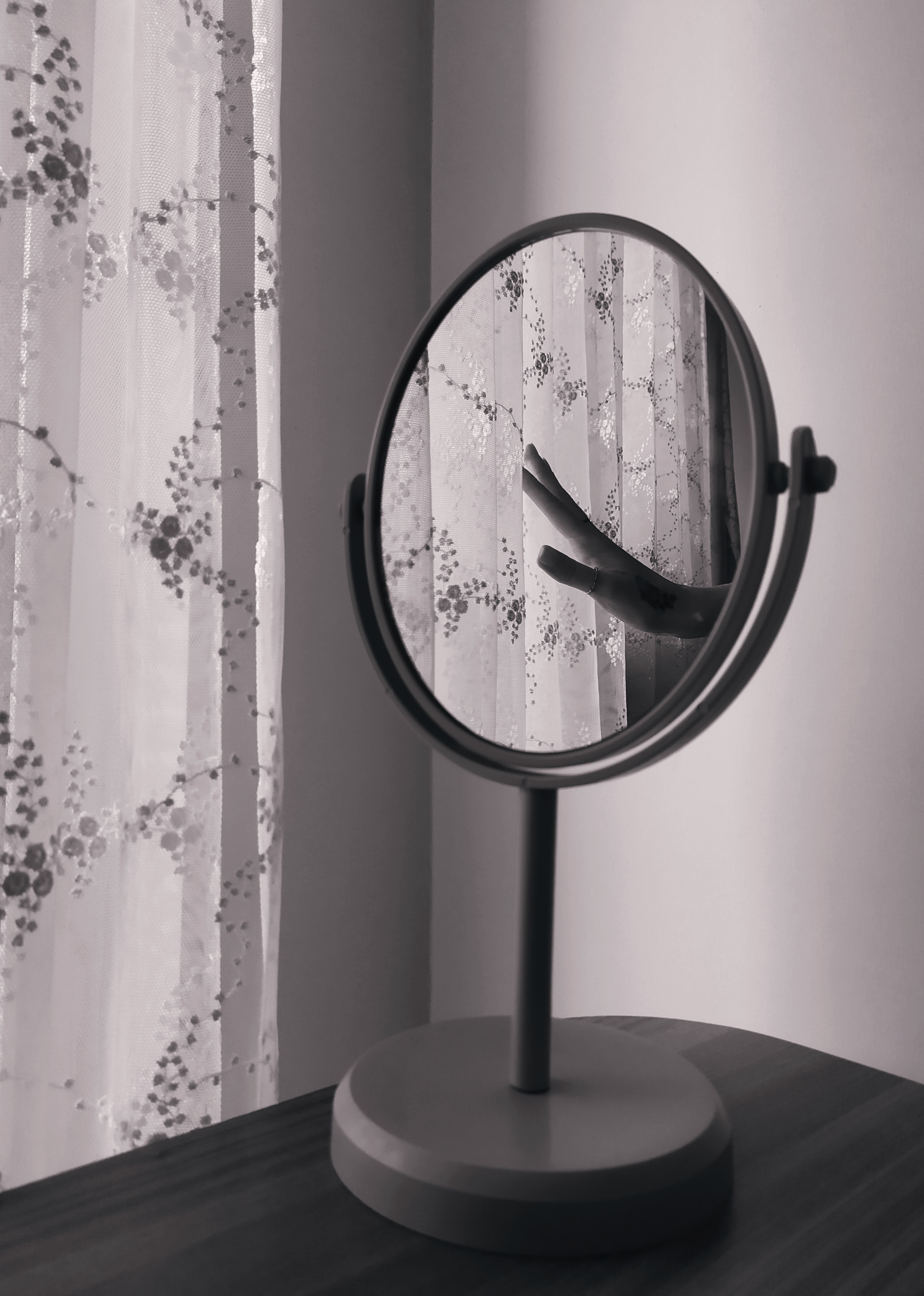 Artistic Reflection in a Round Mirror · Free Stock Photo