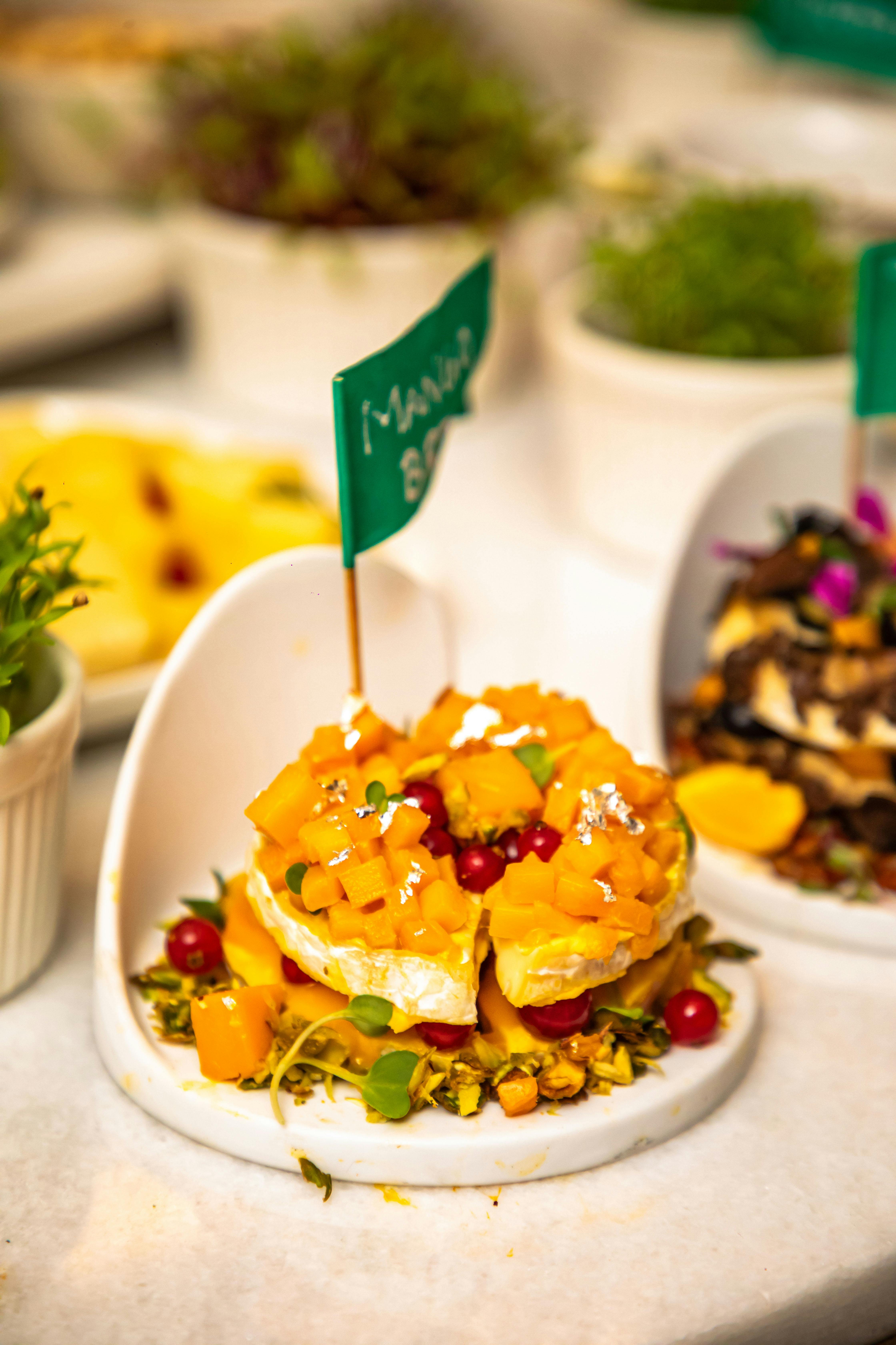 Gourmet Mango Dessert with Fresh Toppings · Free Stock Photo