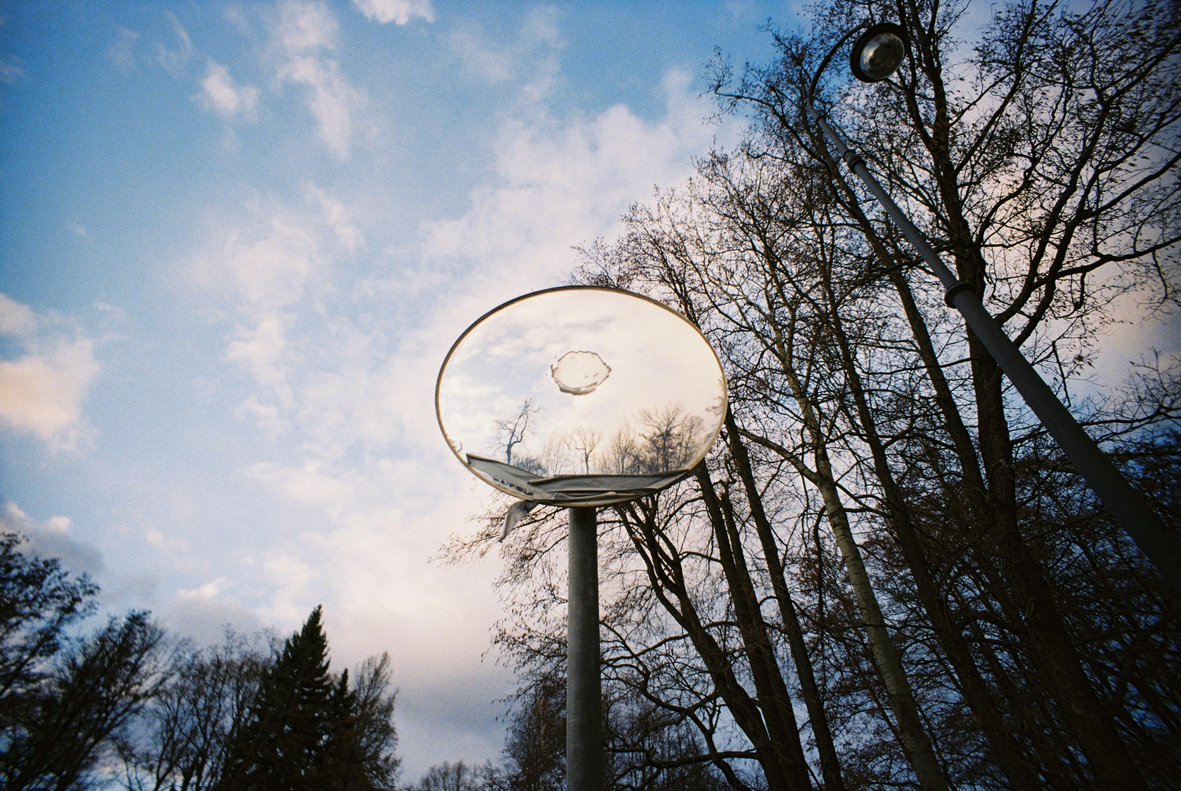 Basketball Hoop Against Clear Blue Sky · Free Stock Photo
