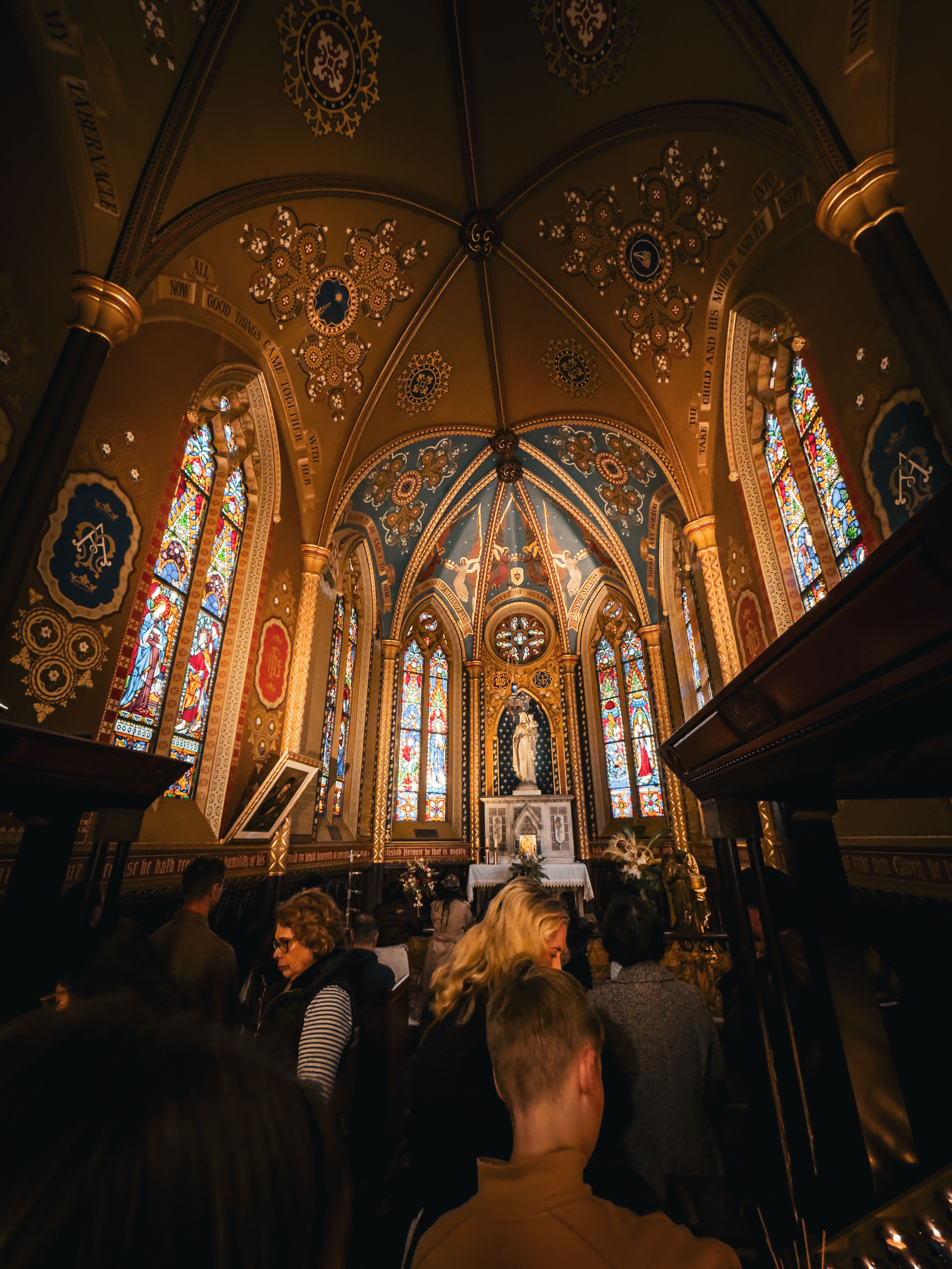 Ornate Church Interior with Stained Glass Windows · Free Stock Photo