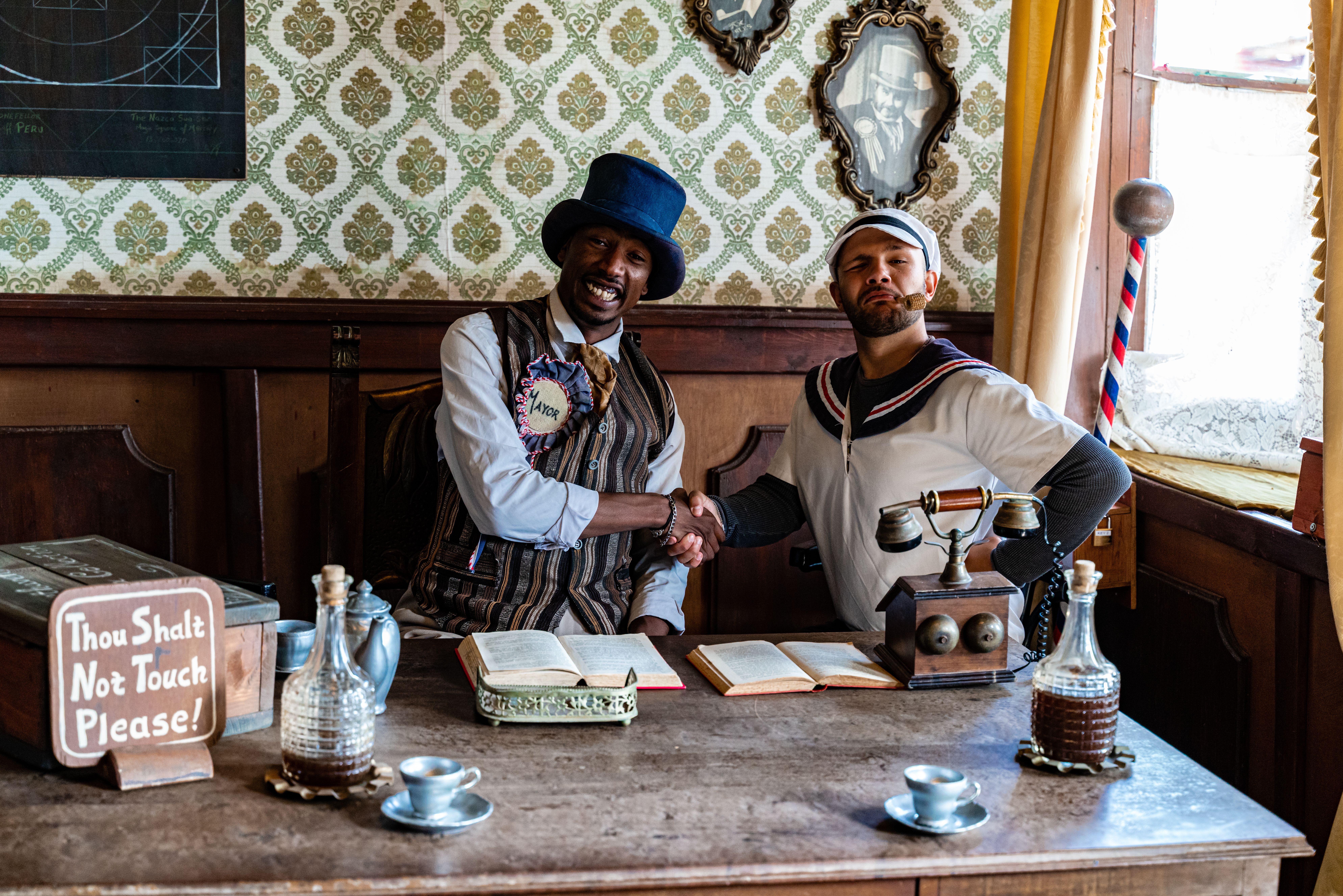 Vintage Themed Handshake in Historical Room · Free Stock Photo