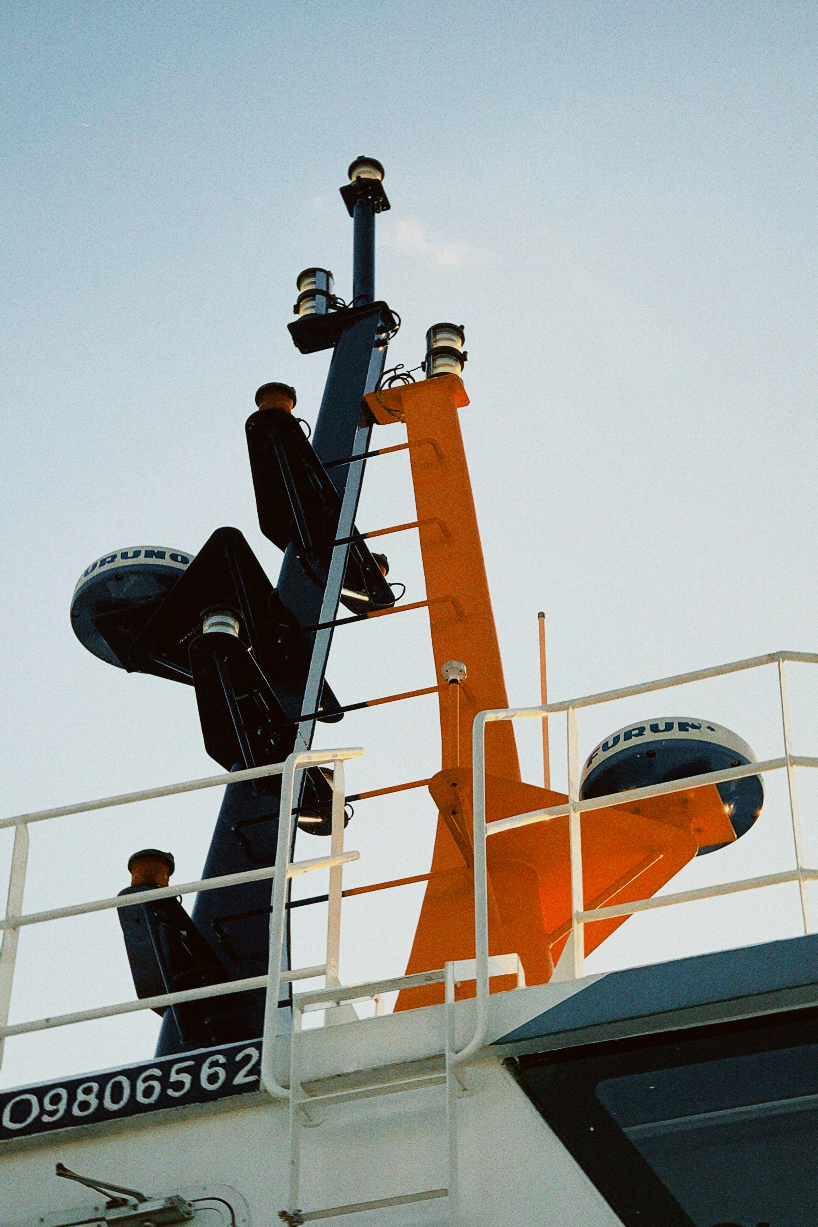 Colorful Ship Antenna and Radar Array at Sunset · Free Stock Photo