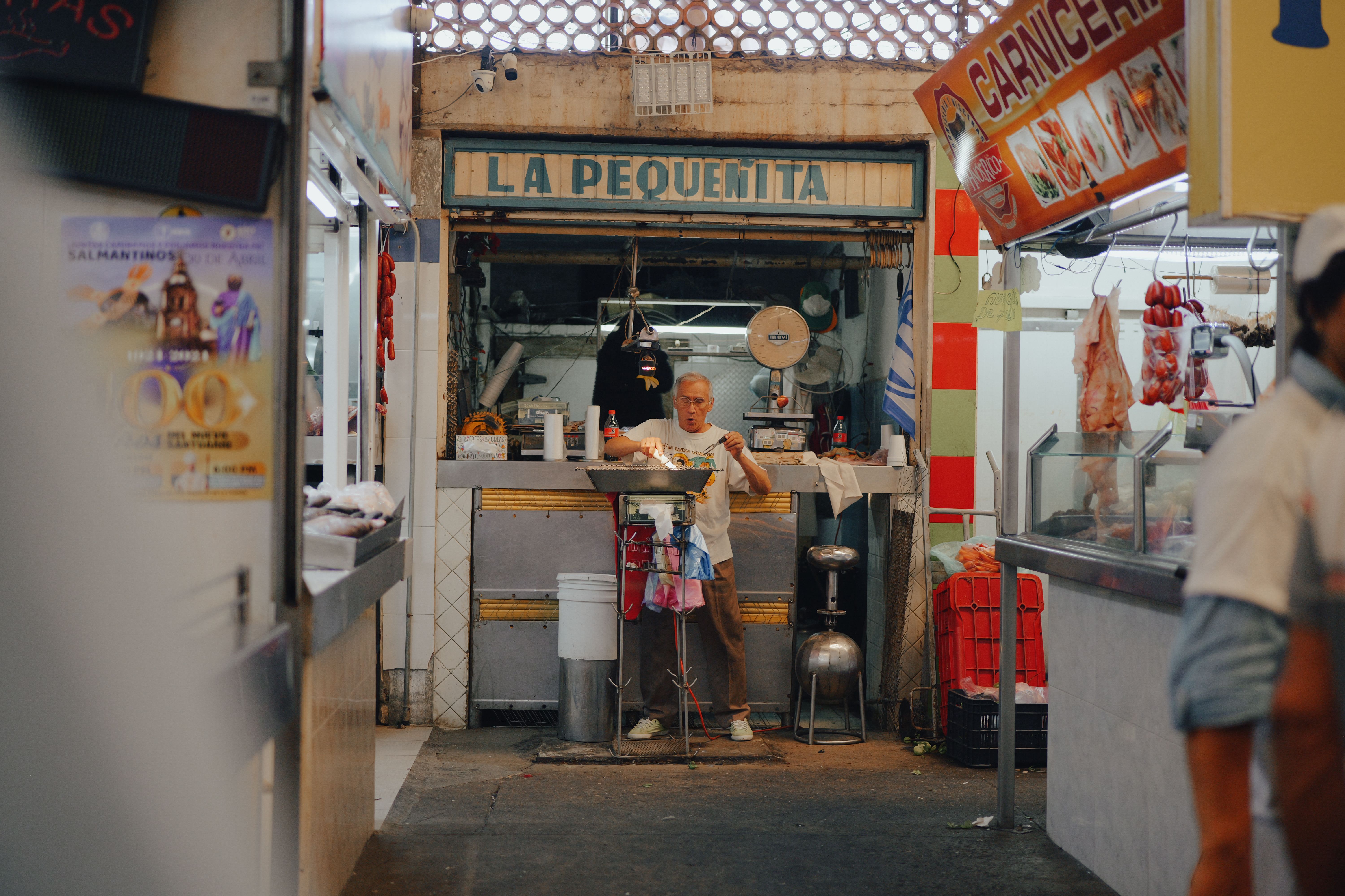 Small Market Vendor in Mexican Food Stall · Free Stock Photo