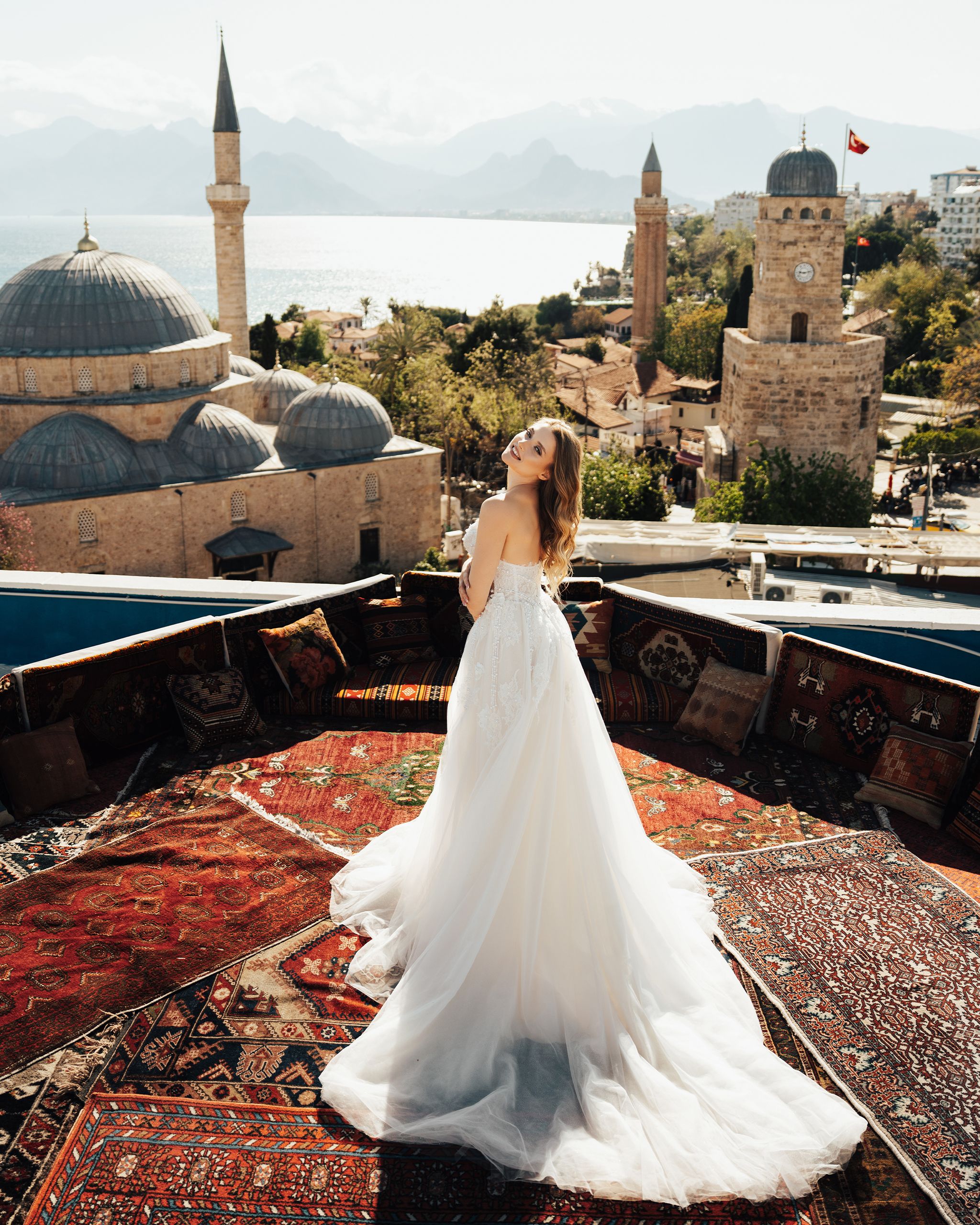 Bride on Rooftop with Scenic View in Turkey · Free Stock Photo