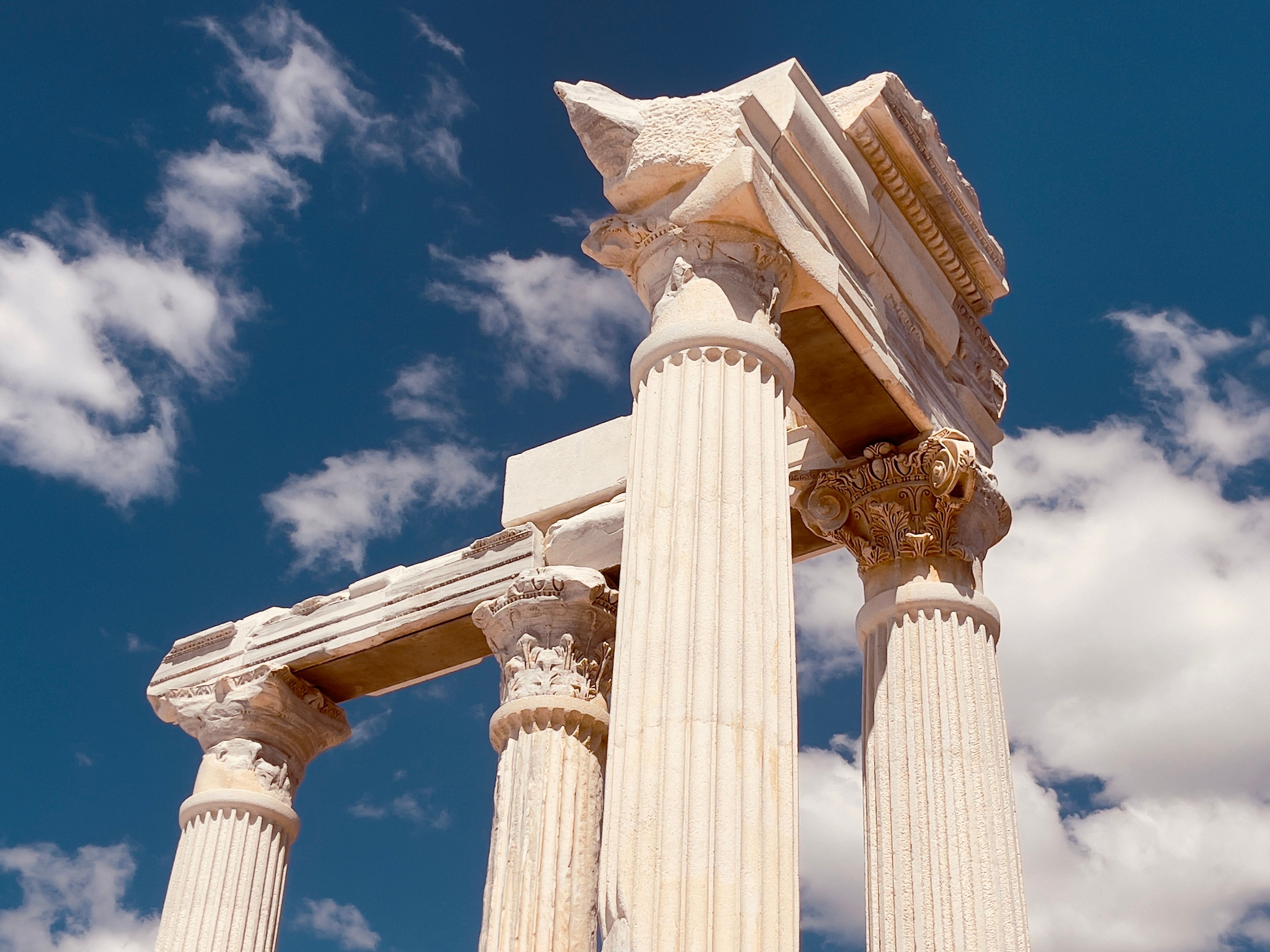 Ancient Greek Ruins Under Blue Sky · Free Stock Photo