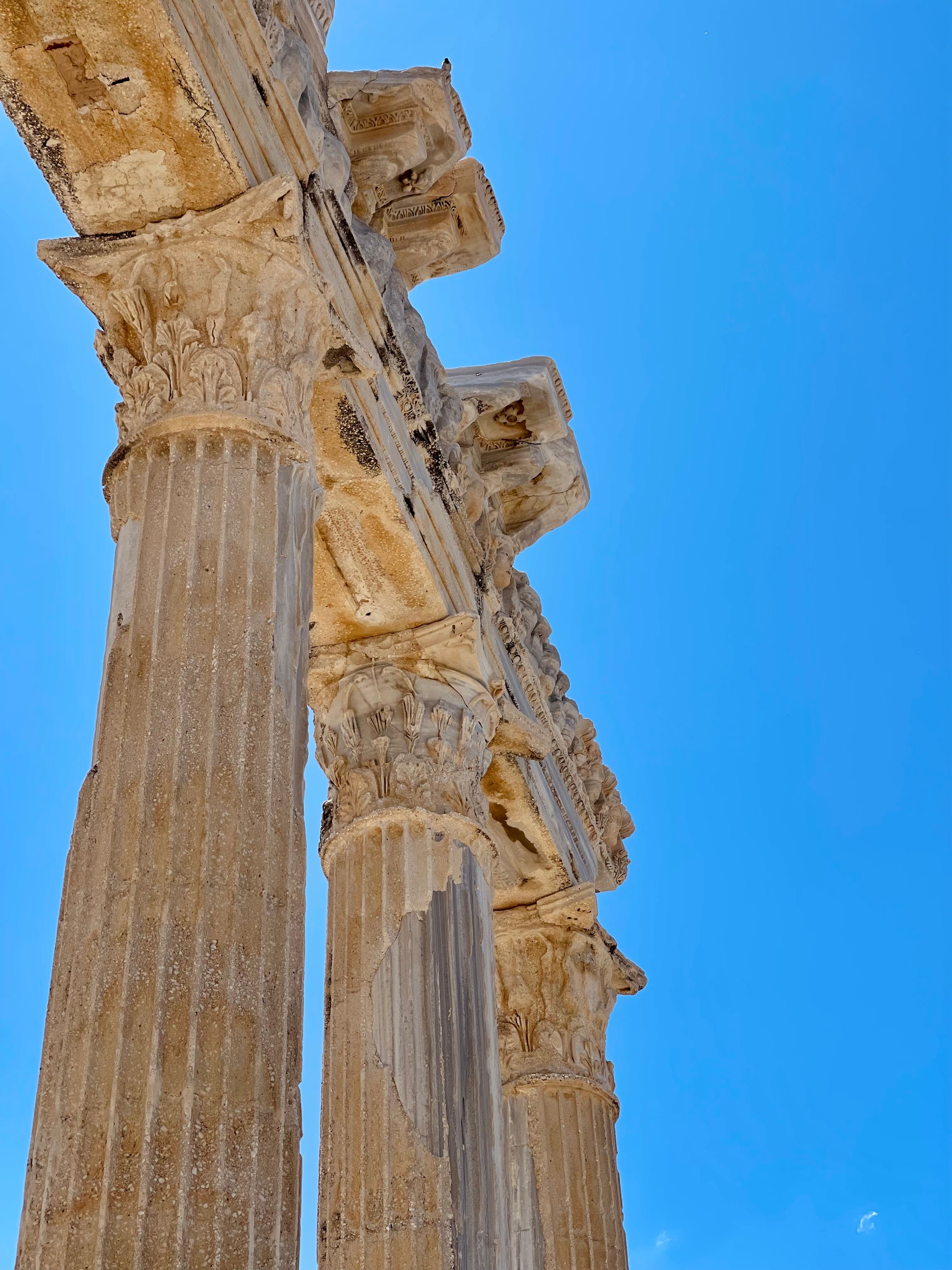 Ancient Roman Columns Against Blue Sky · Free Stock Photo