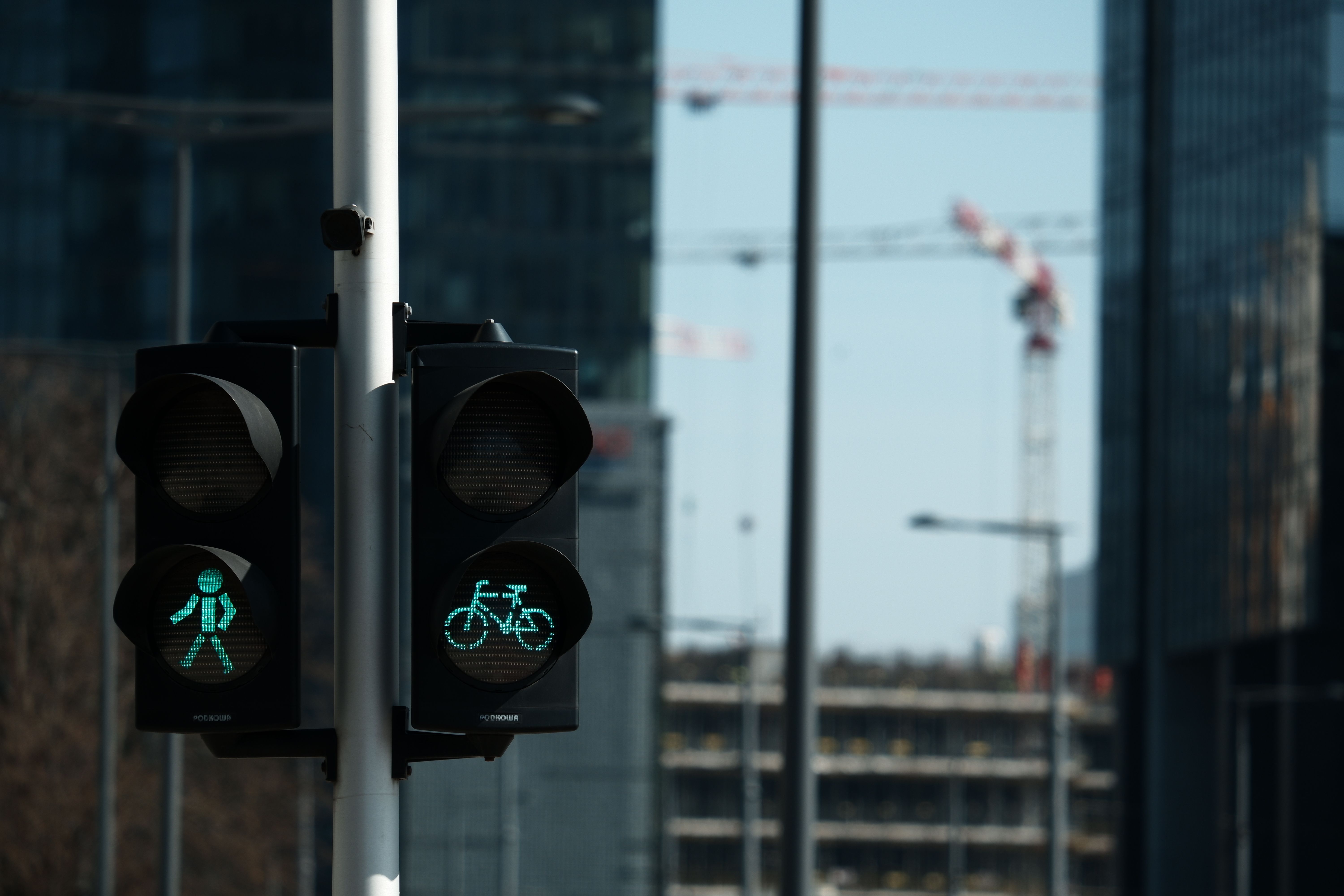 Urban Traffic Signals with Construction Background · Free Stock Photo