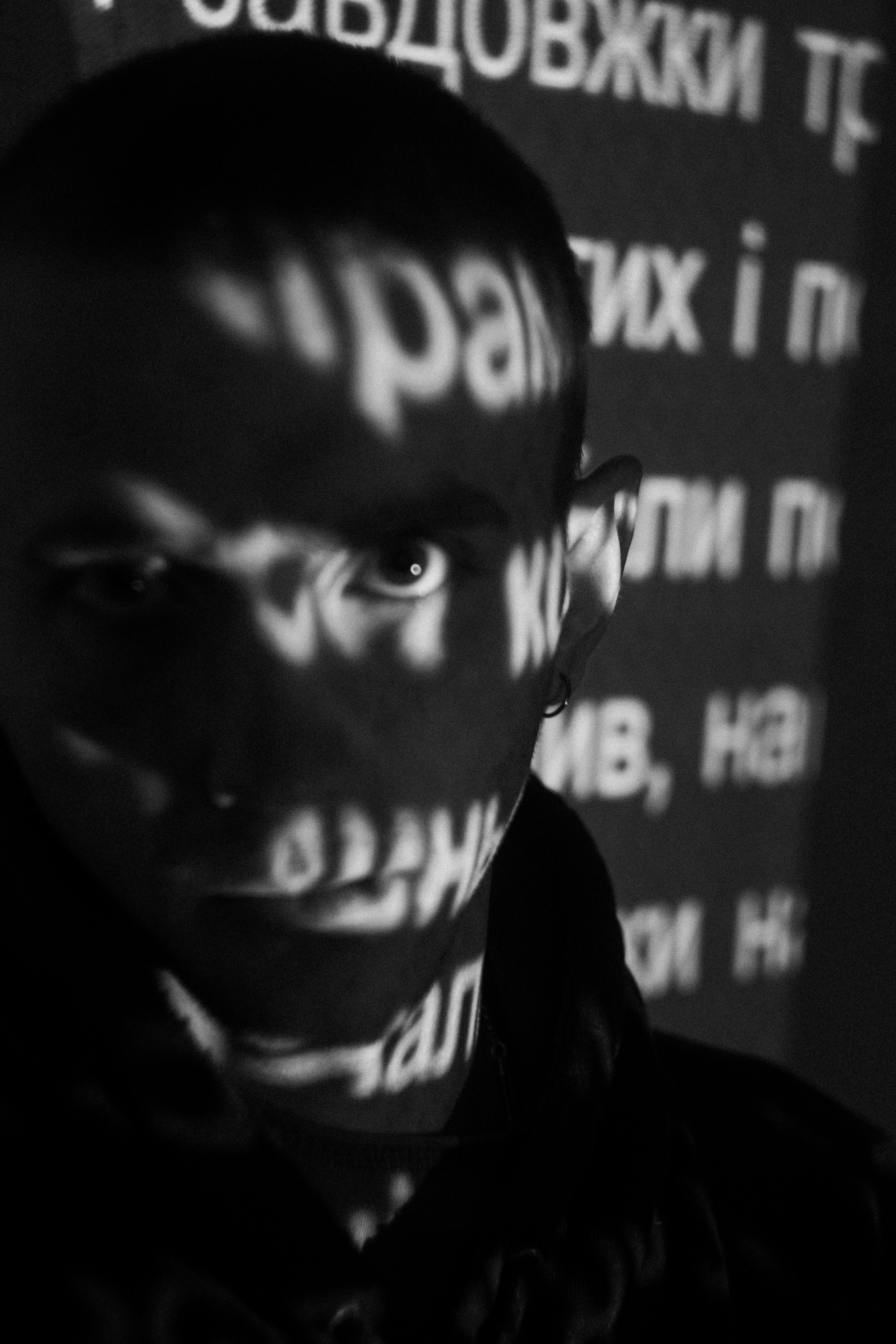Moody Portrait with Projected Text Lighting · Free Stock Photo