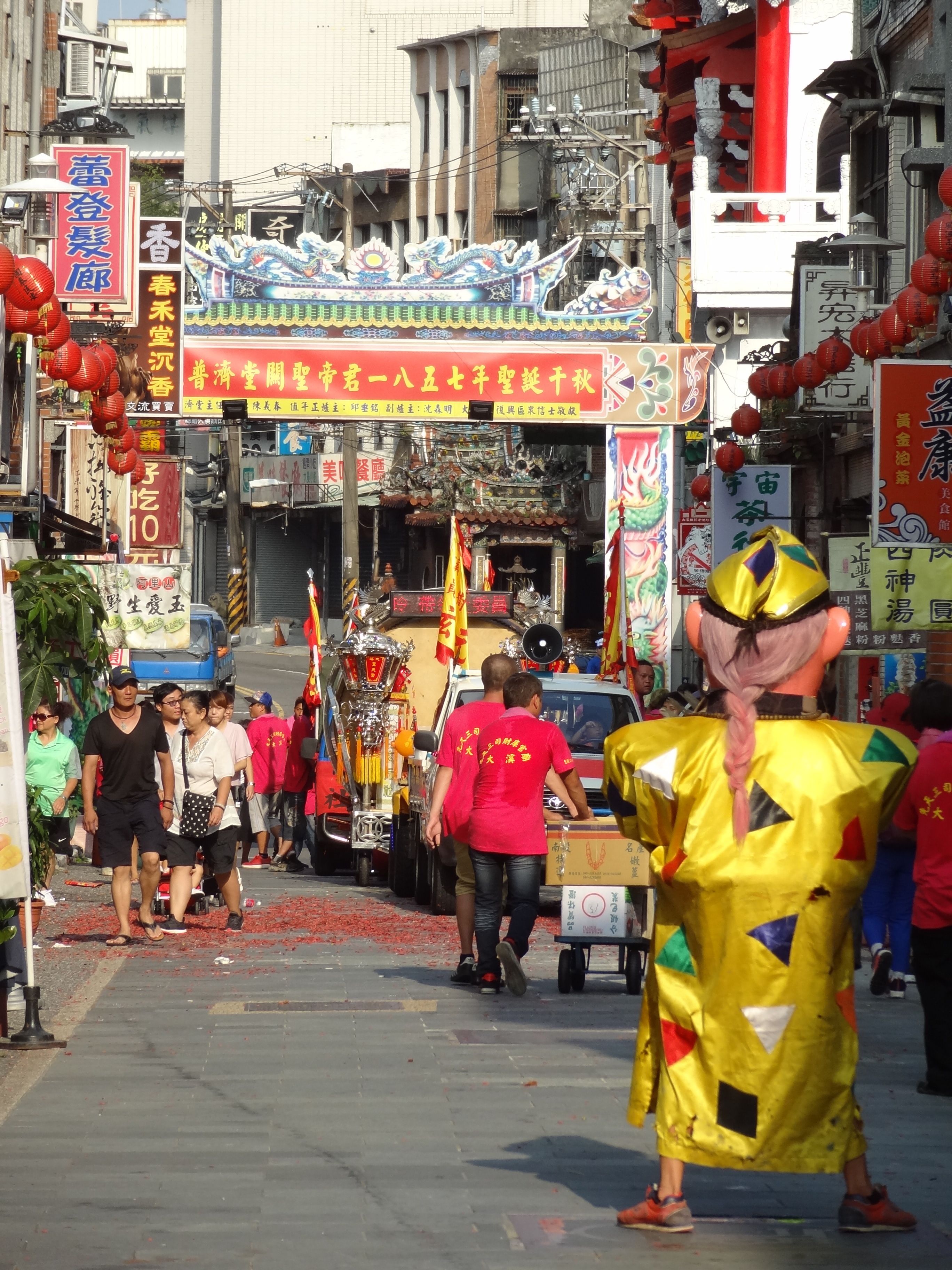 Vibrant Festival Parade in a Traditional Asian Street · Free Stock Photo