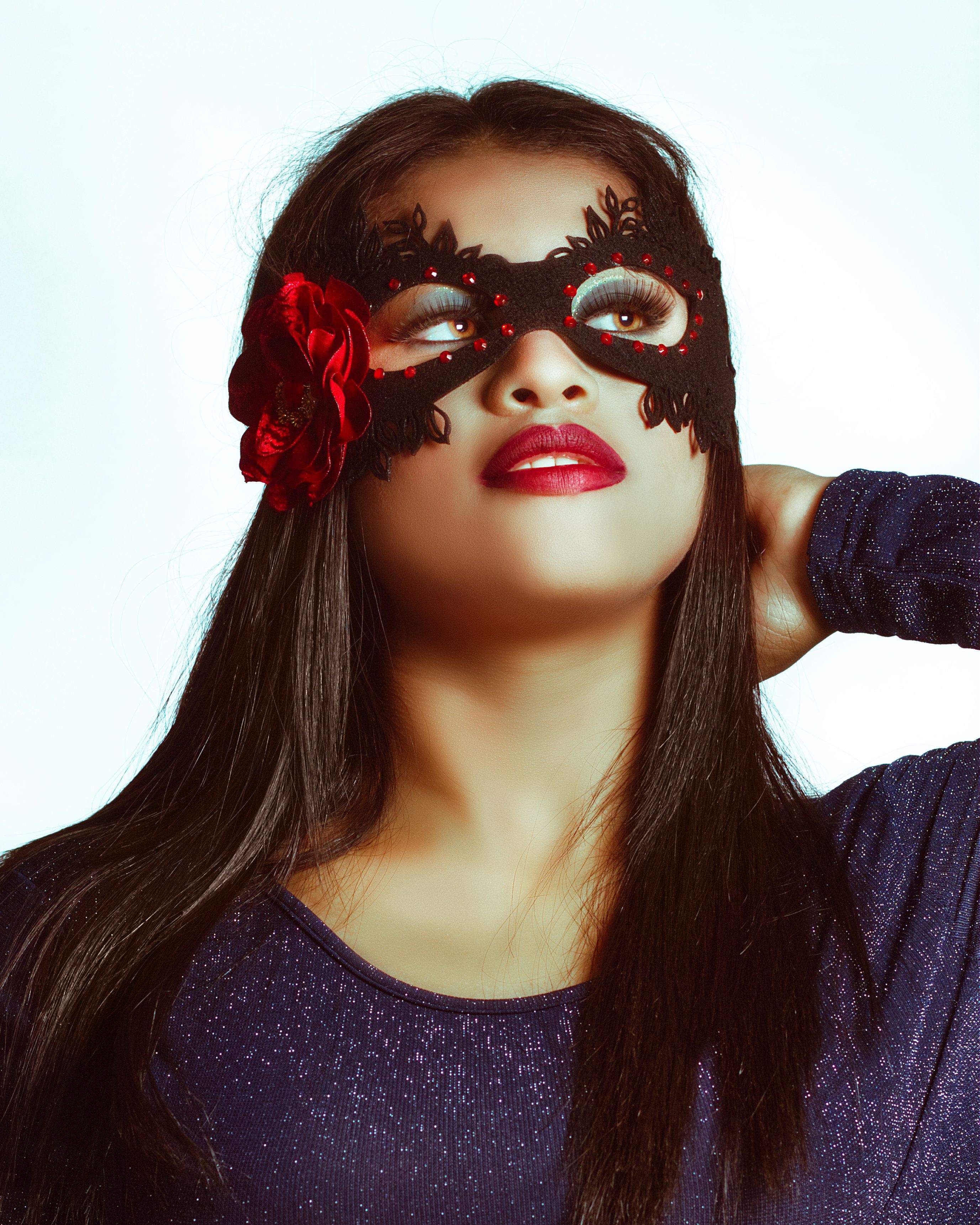 Elegant Woman Wearing a Red and Black Masquerade Mask · Free Stock Photo