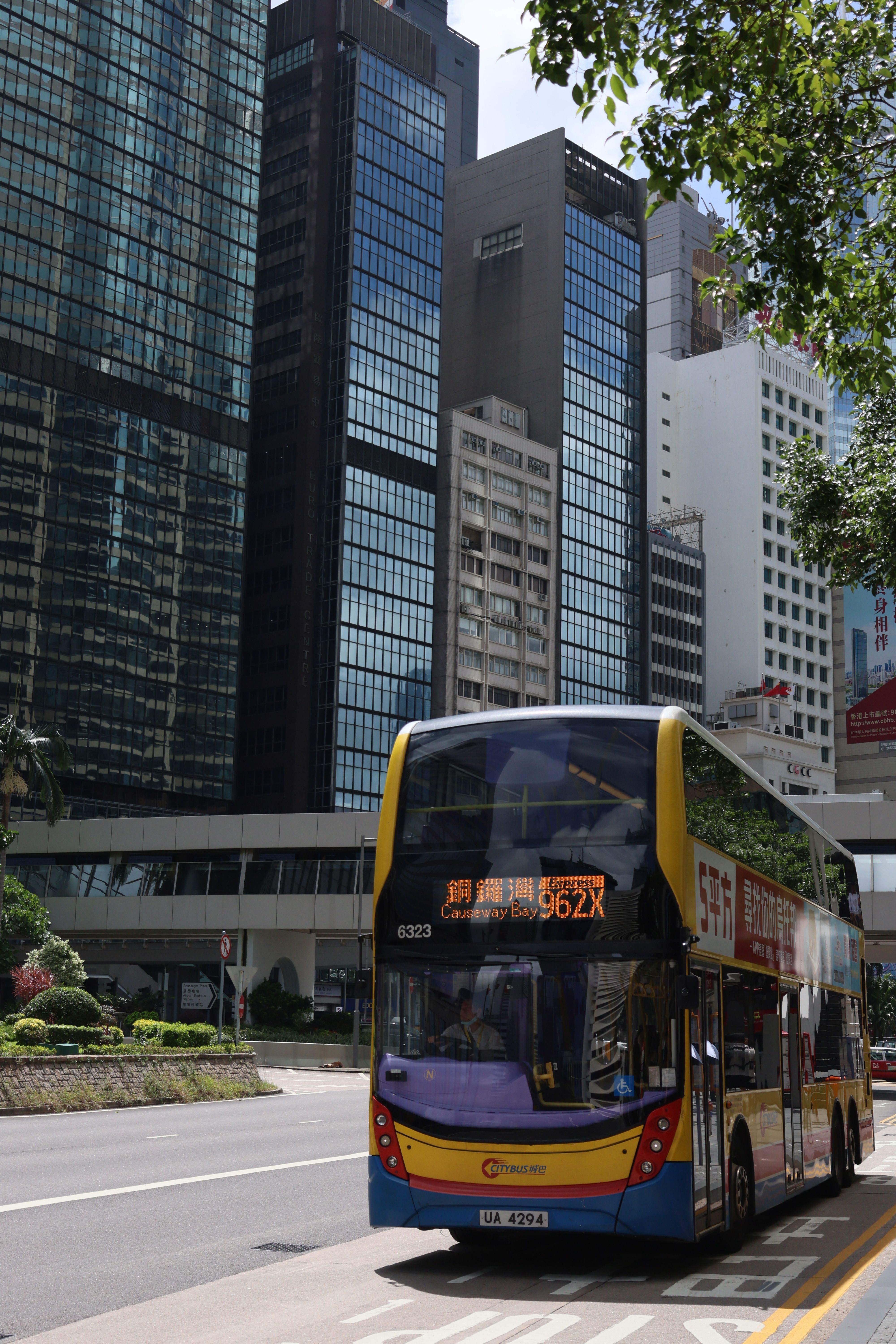 Colorful Double-decker Bus in Urban Cityscape · Free Stock Photo