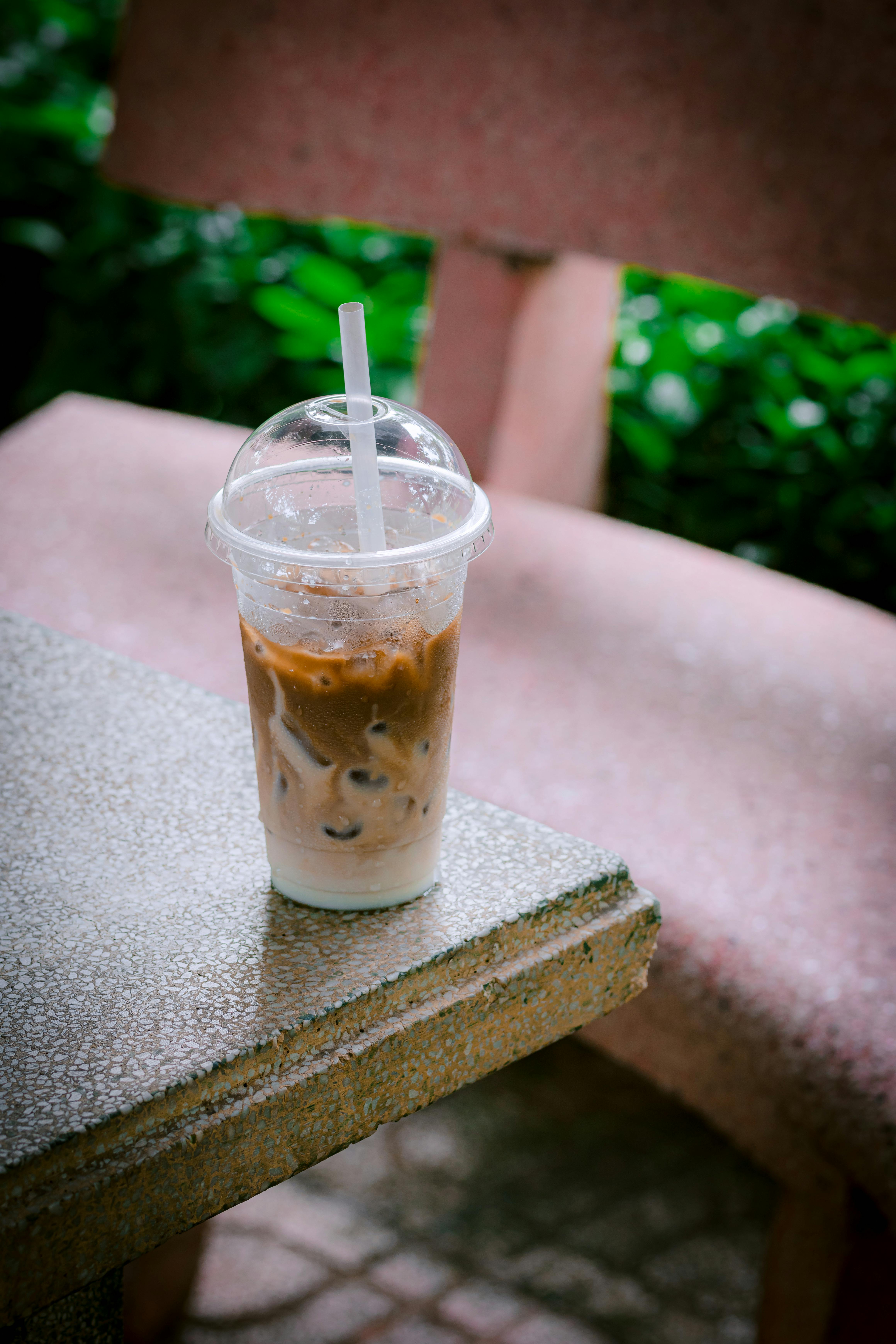 Refreshing Iced Coffee with Headphones and Mug · Free Stock Photo