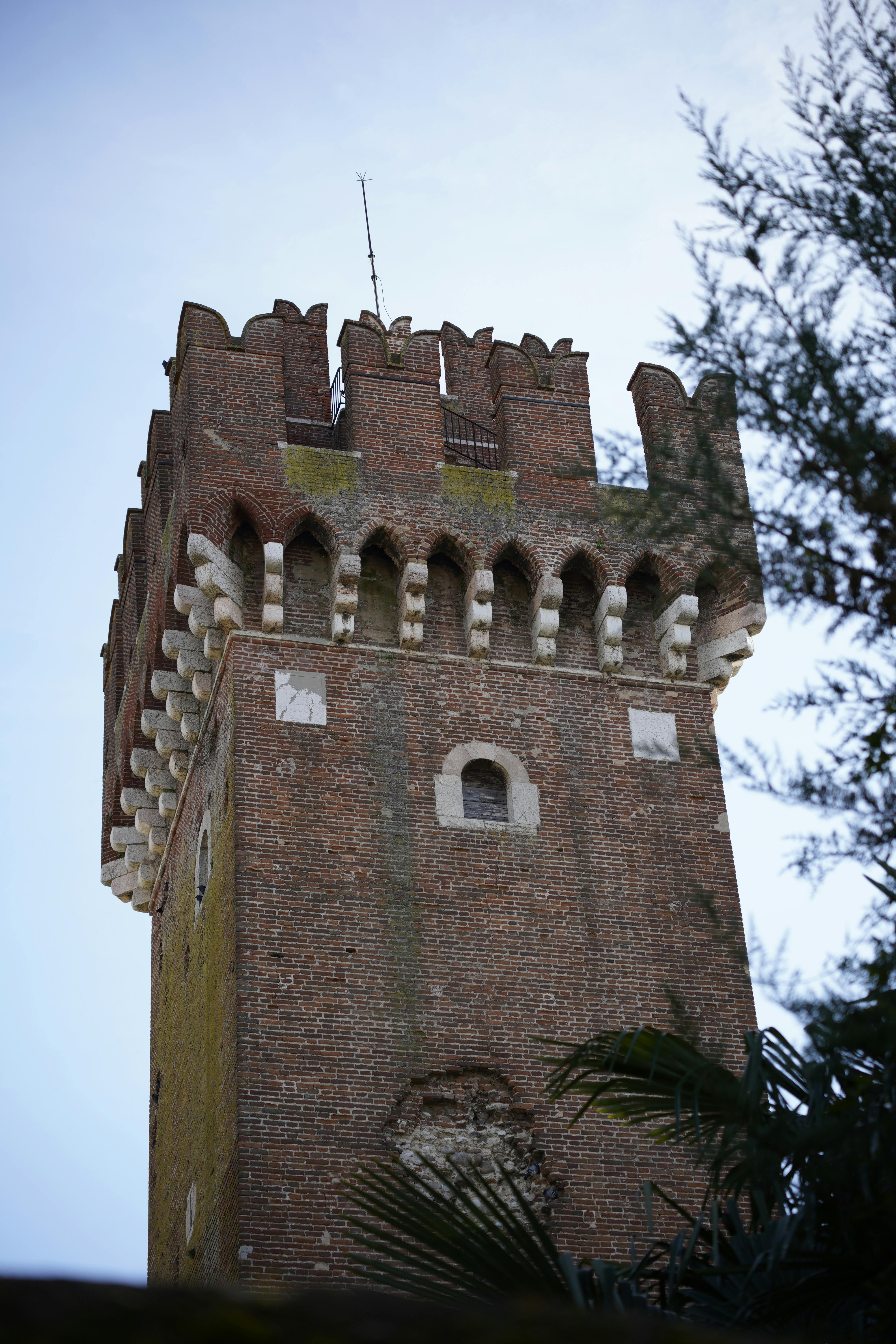 Medieval Italian Tower with Brick Battlements · Free Stock Photo