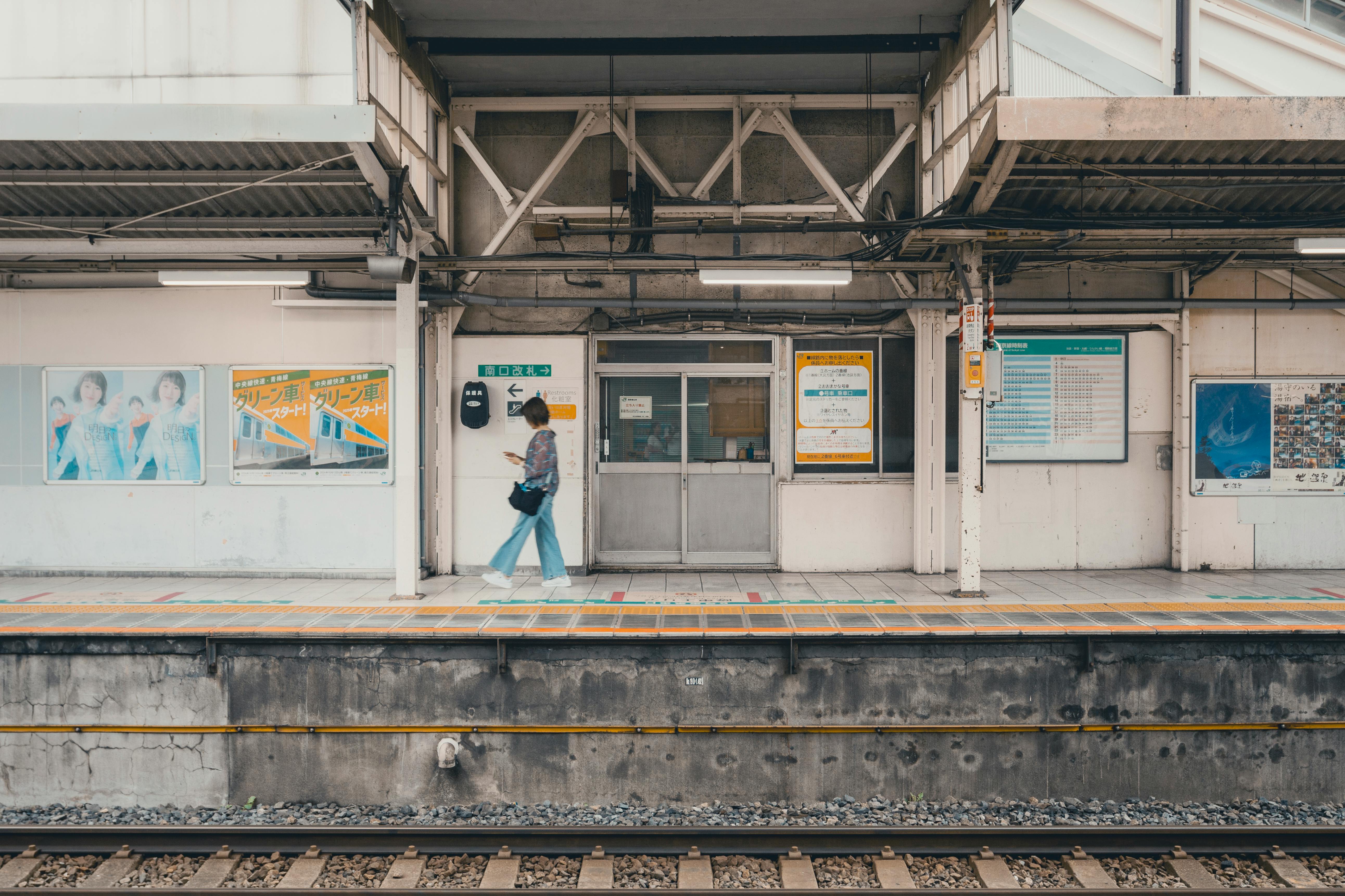 Woman Walking on Platform at Tokyo Train Station · Free Stock Photo