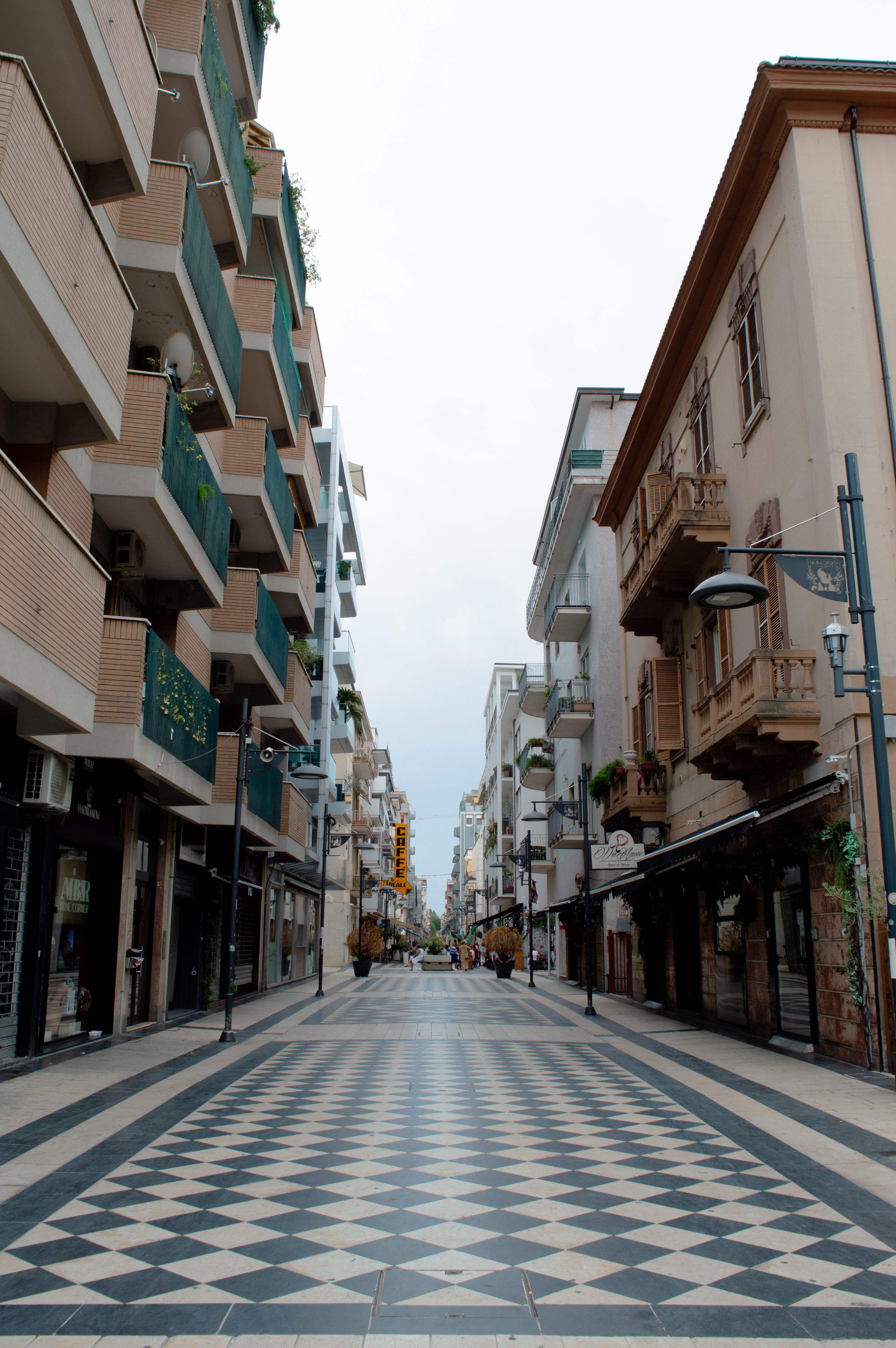 Charming Pedestrian Street with Geometric Patterns · Free Stock Photo