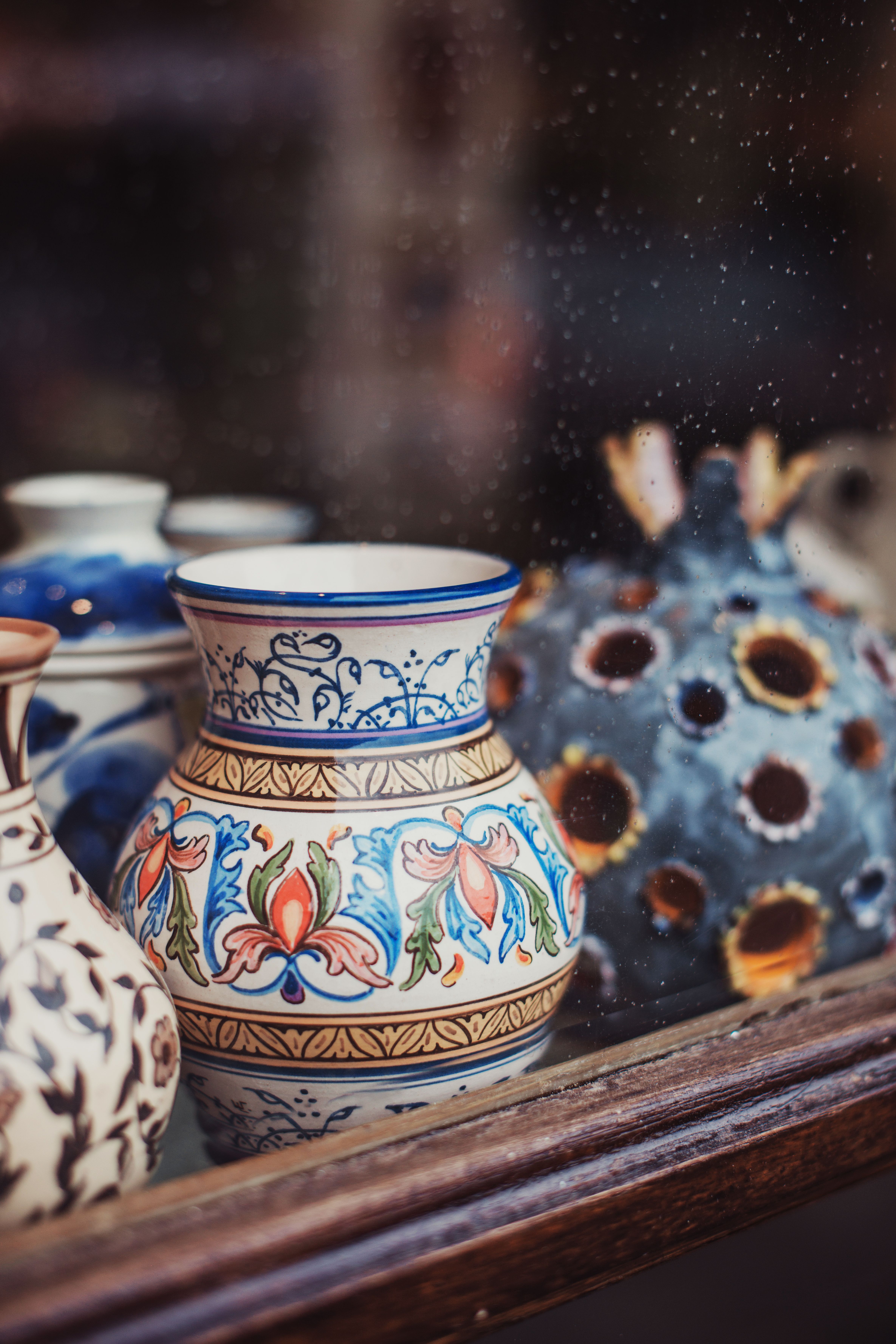 Colorful Artisan Ceramic Vases in Shop Display · Free Stock Photo