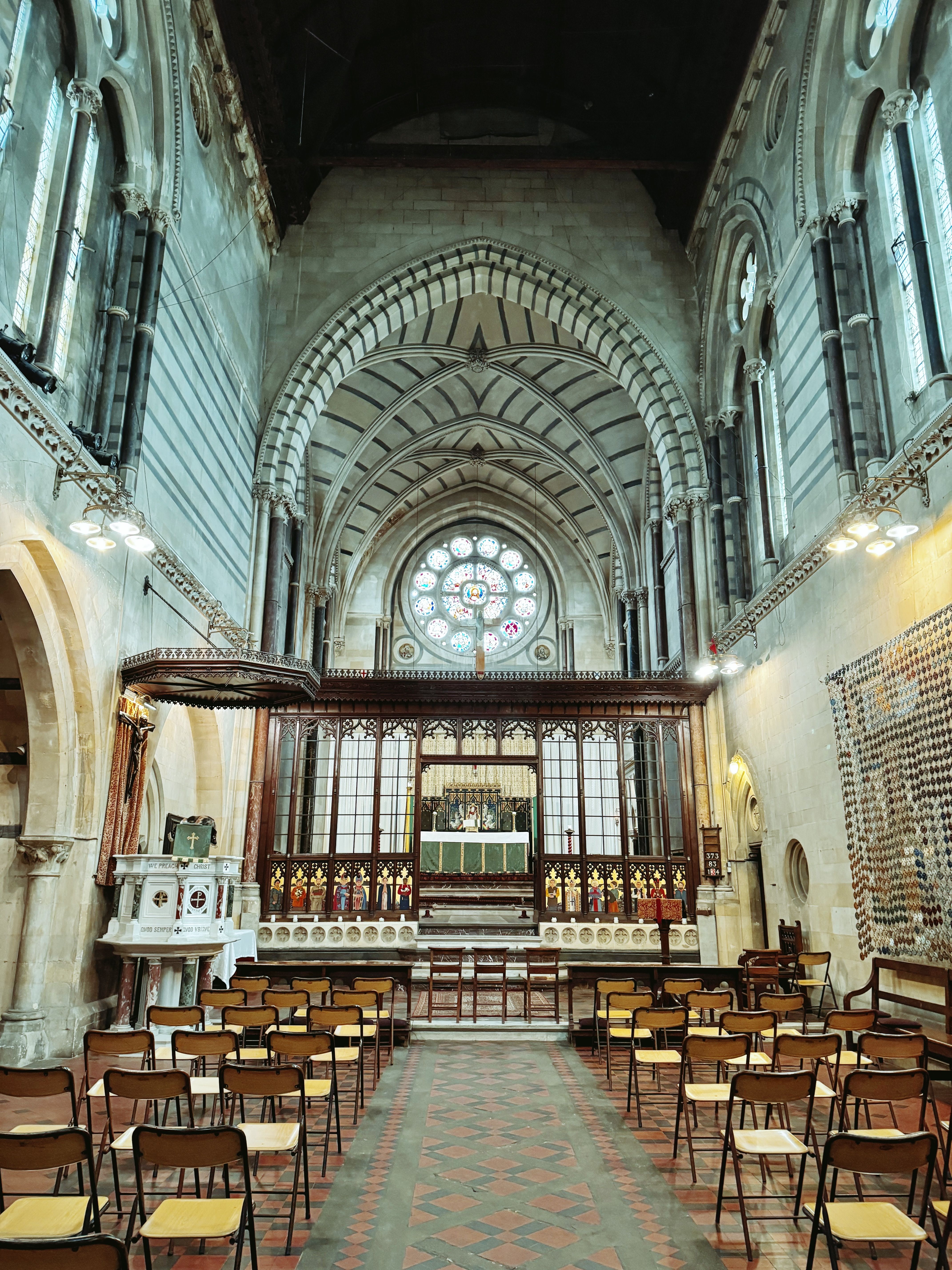 Historic Gothic Church Interior with Empty Chairs · Free Stock Photo
