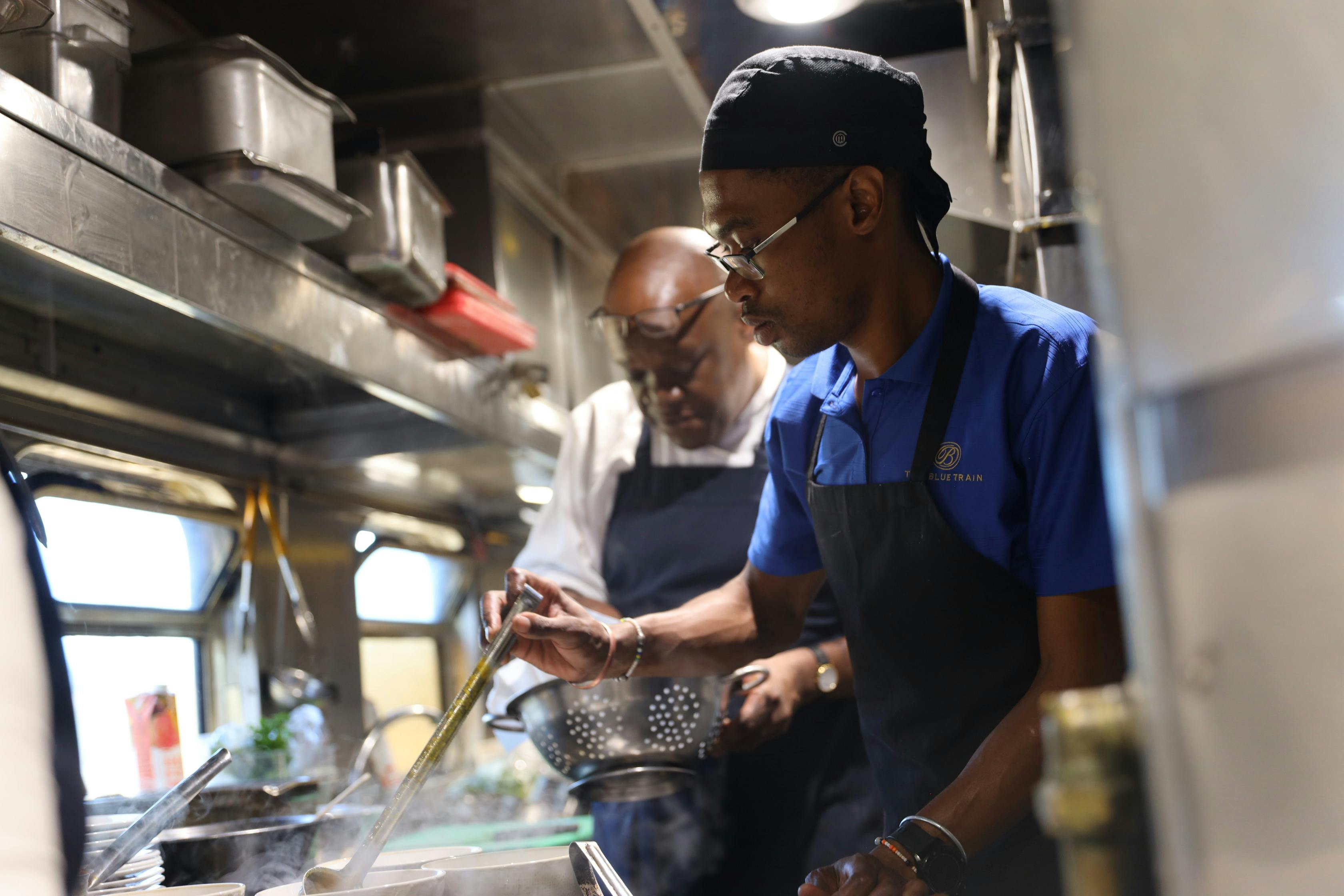 Chefs Cooking in Professional Train Kitchen · Free Stock Photo