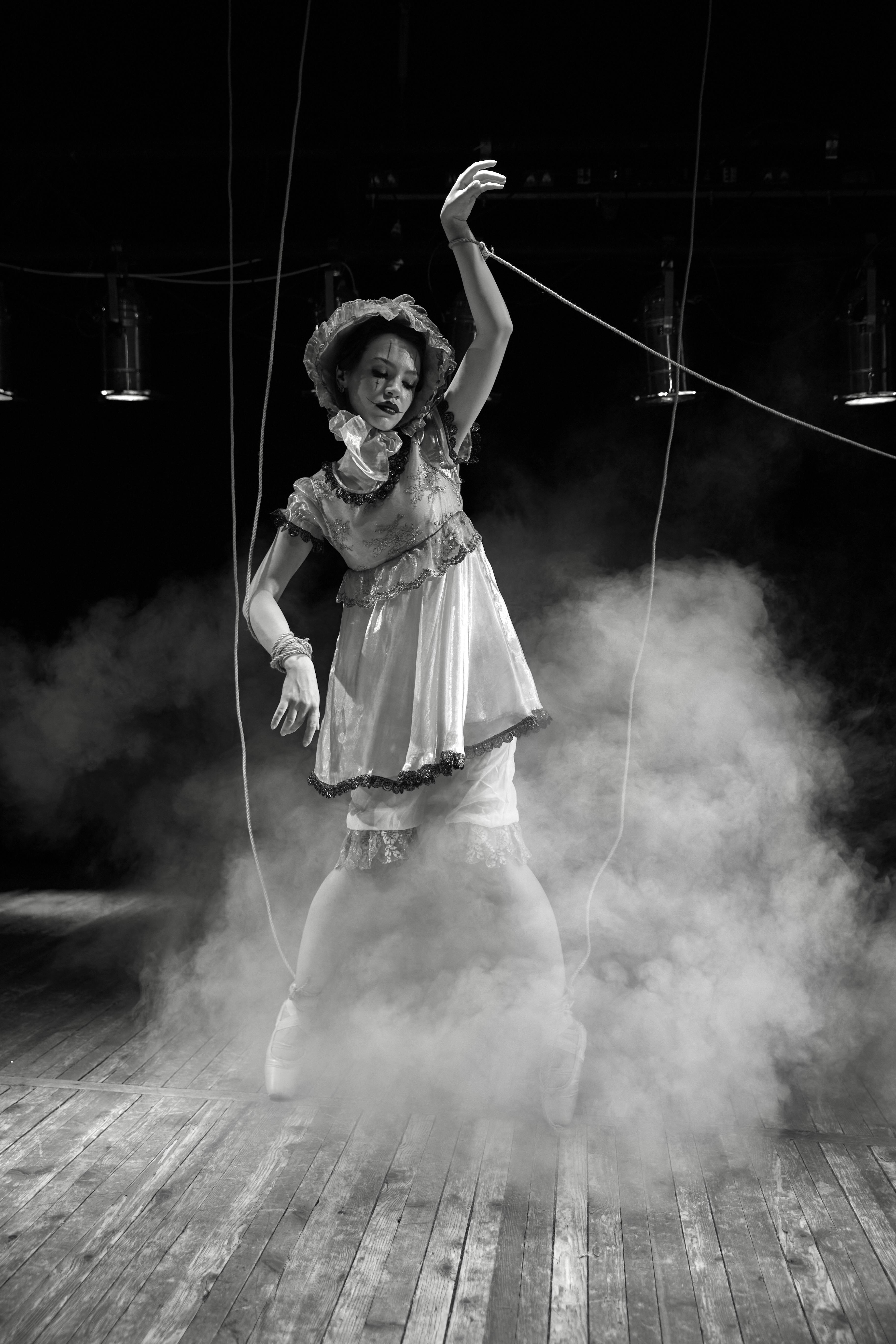 Black and White Puppet Performer on Stage · Free Stock Photo